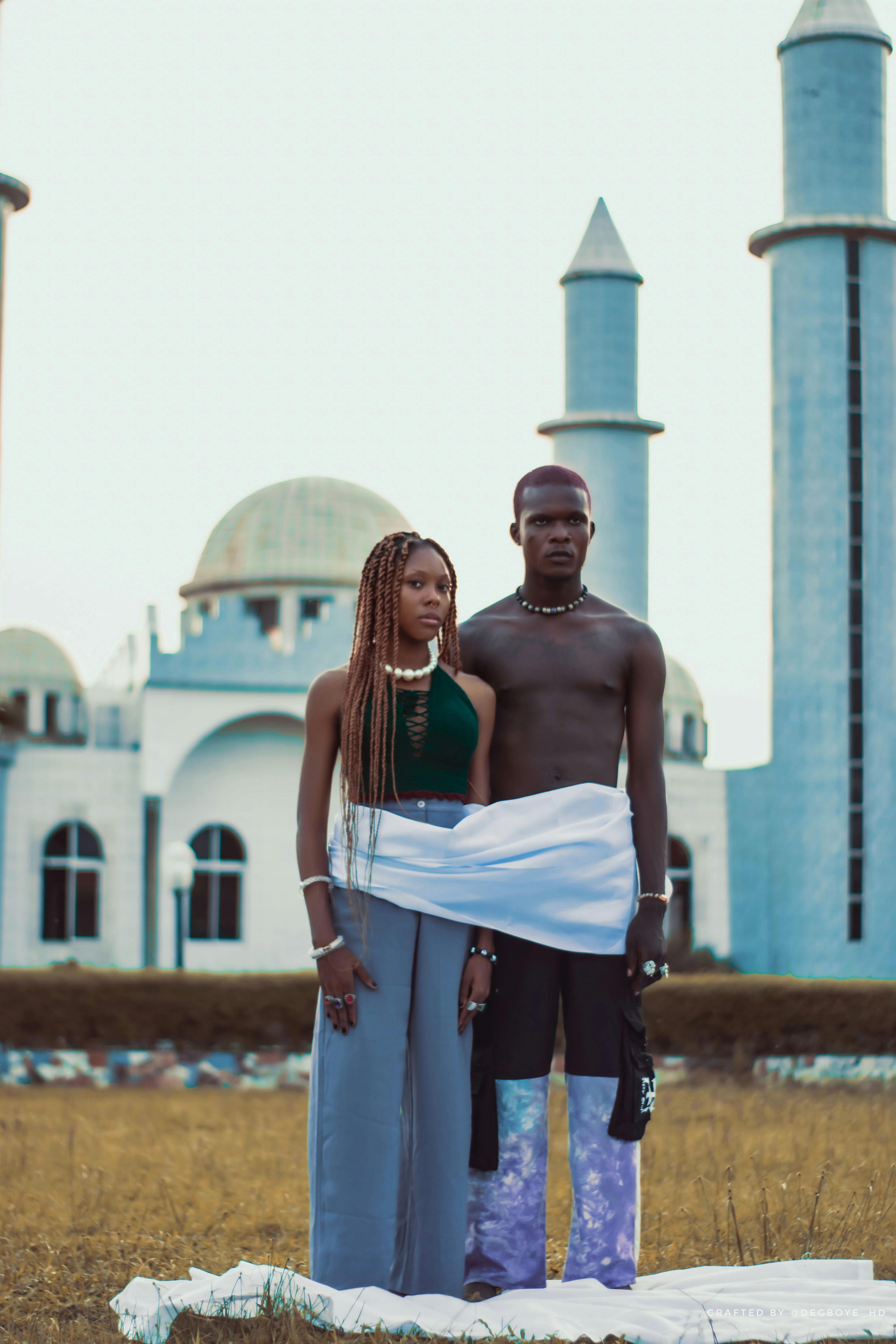 Couple Standing Near Chinese Building · Free Stock Photo
