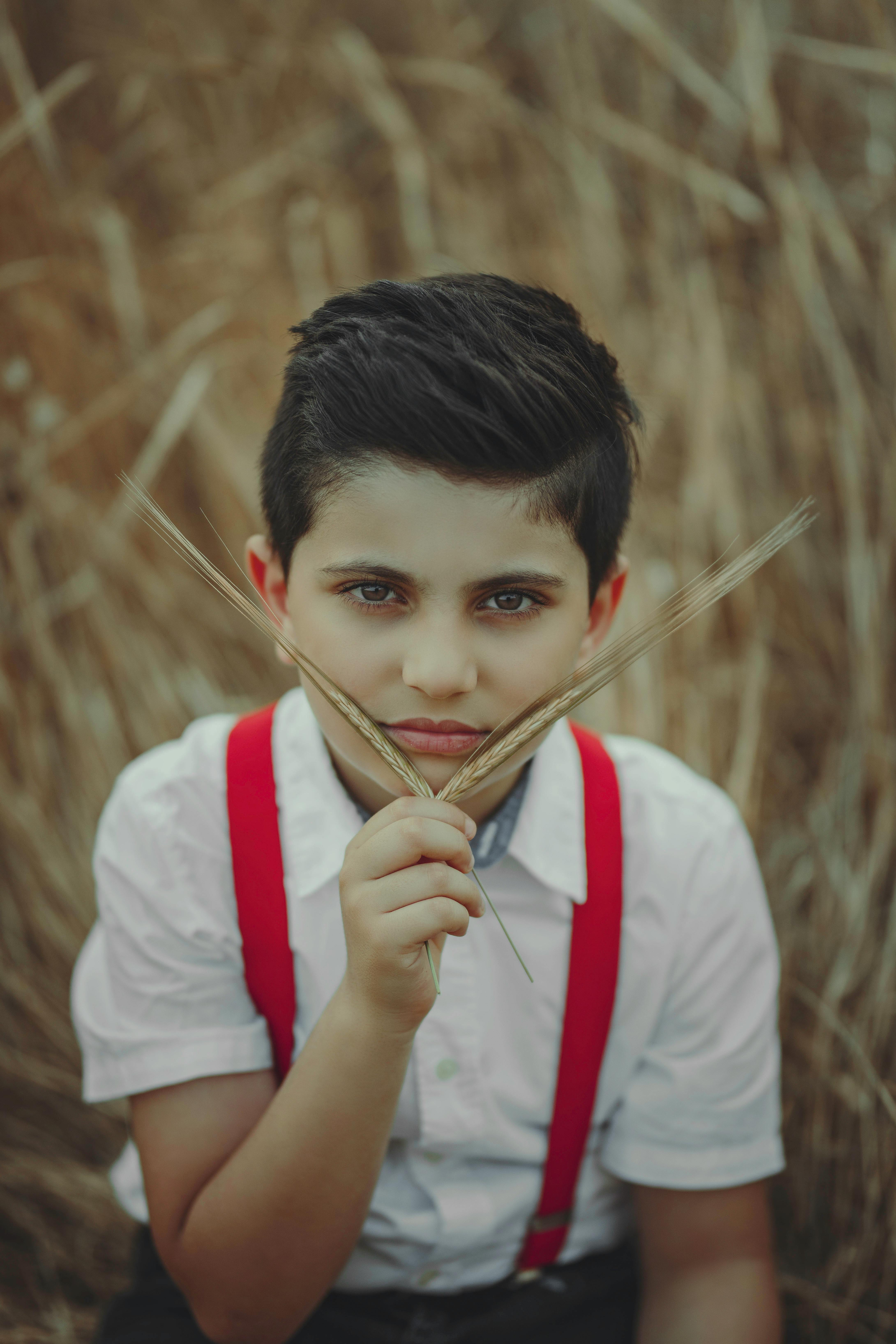 Photo of a Boy in White Shirt Dancing · Free Stock Photo