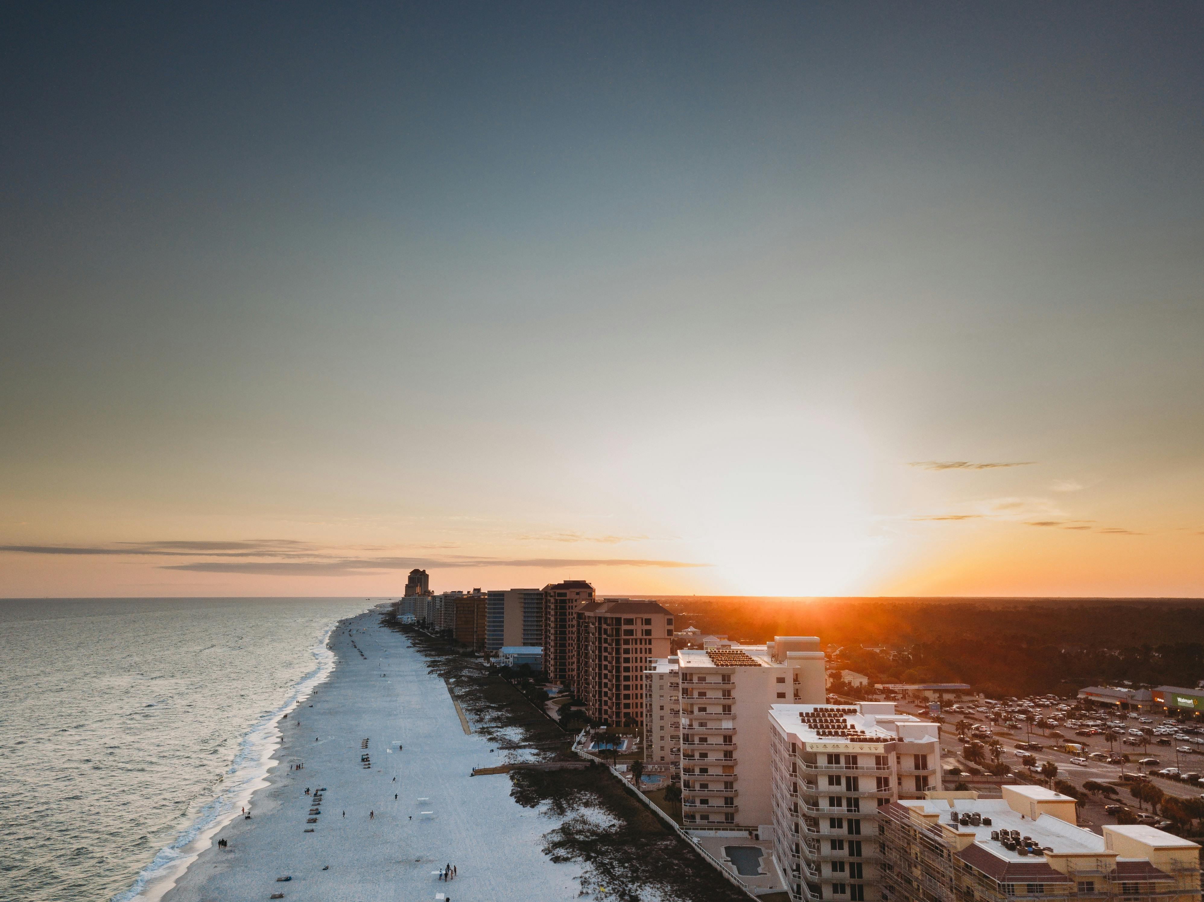 Aerial Photography of Buildings near a Beach · Free Stock Photo