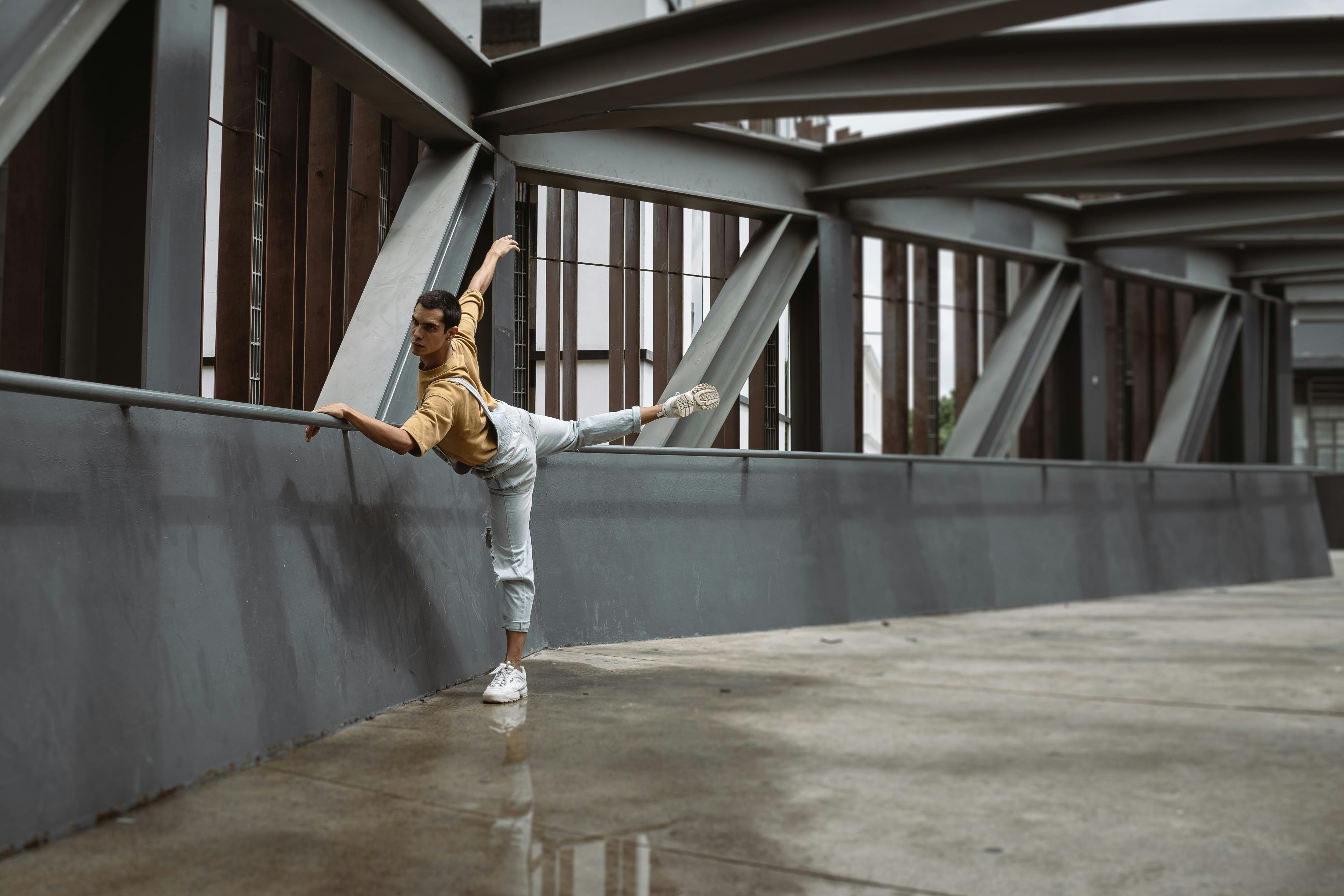A Man Dancing in a Driveway · Free Stock Photo