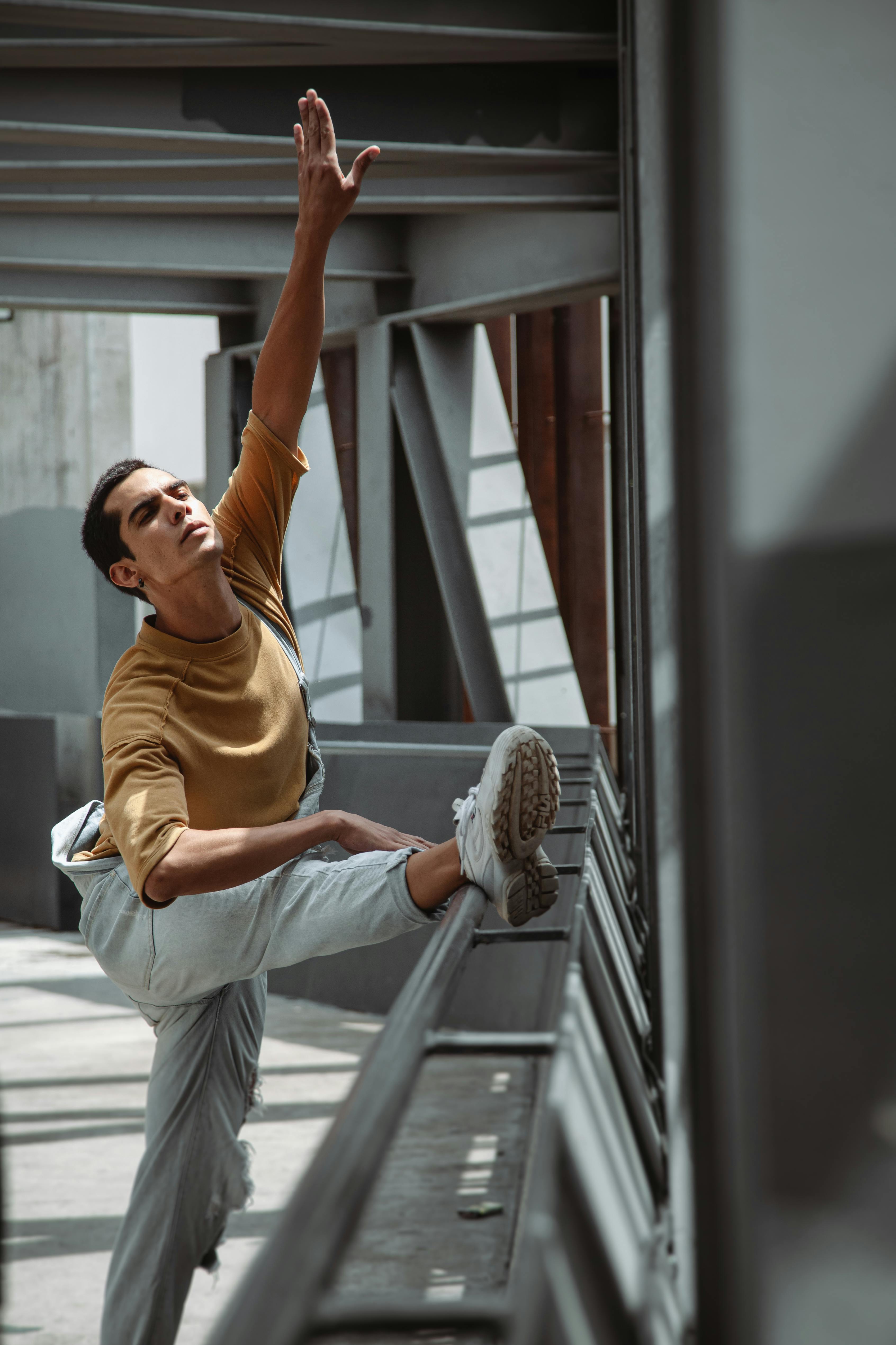 A Man Dancing in a Driveway · Free Stock Photo