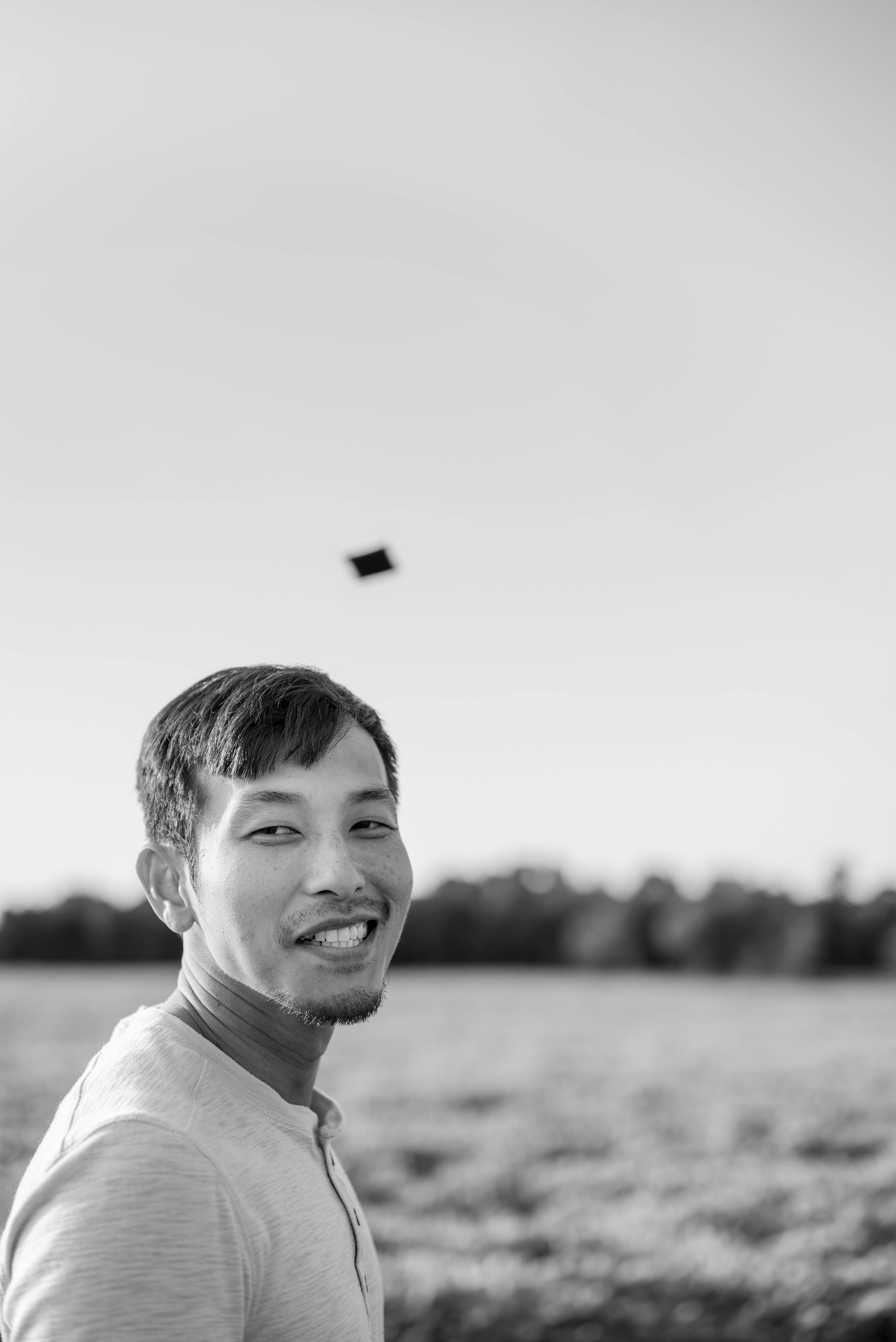 A Man Standing Still with His Eyes Closed · Free Stock Photo