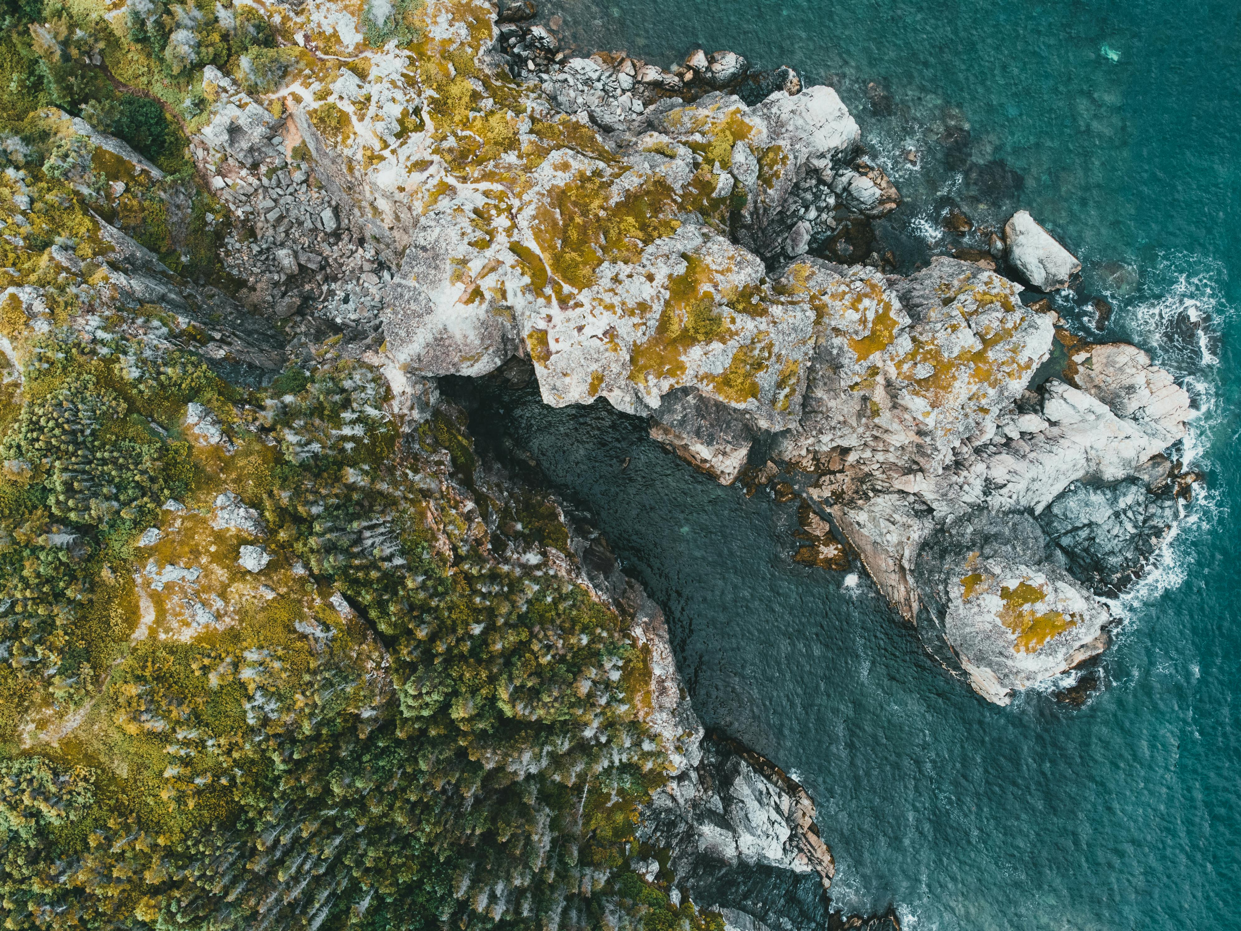Top View of Rock Formations by the Sea · Free Stock Photo
