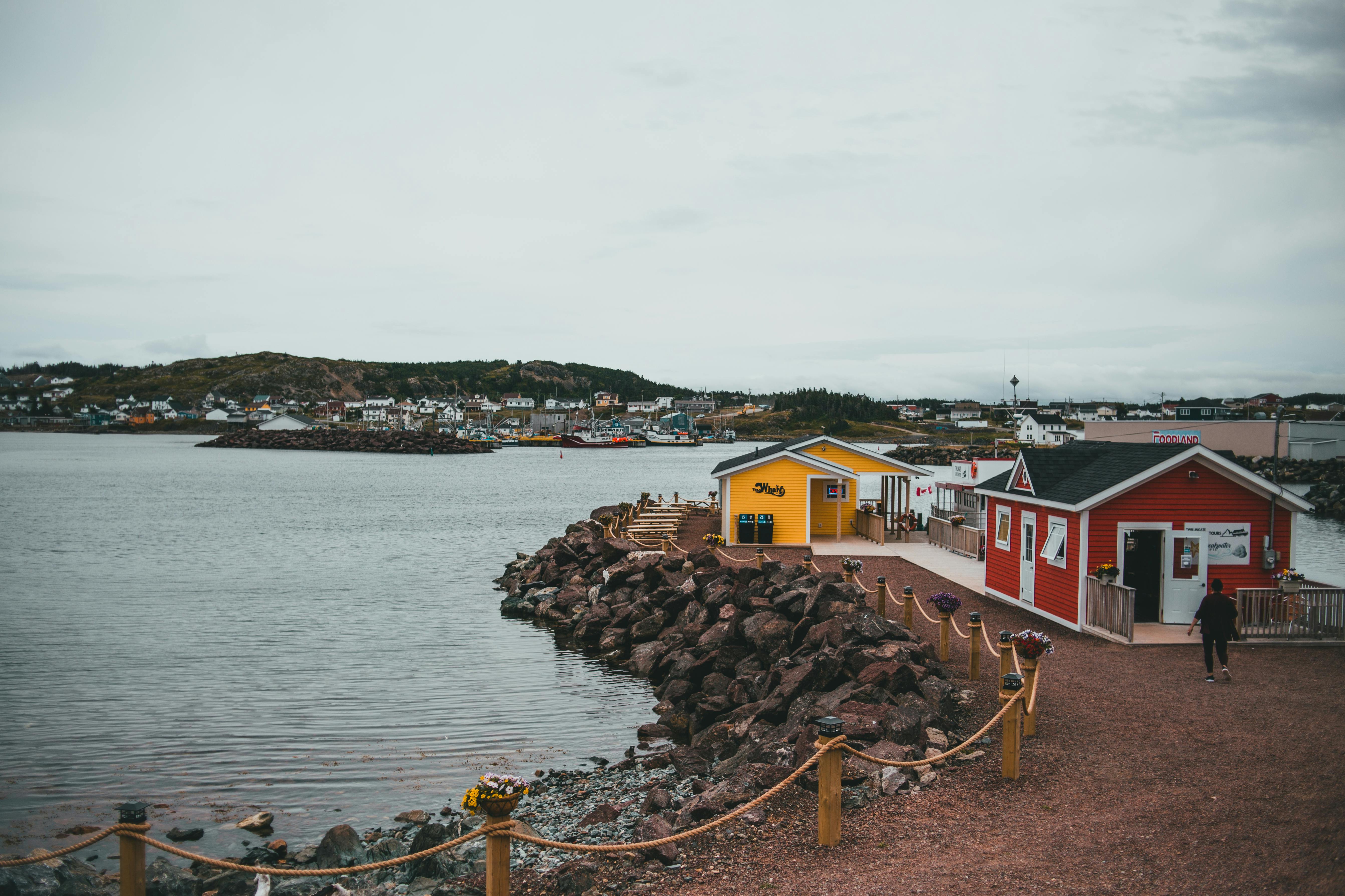 Colorful Wooden Houses on Coast neat Sea · Free Stock Photo