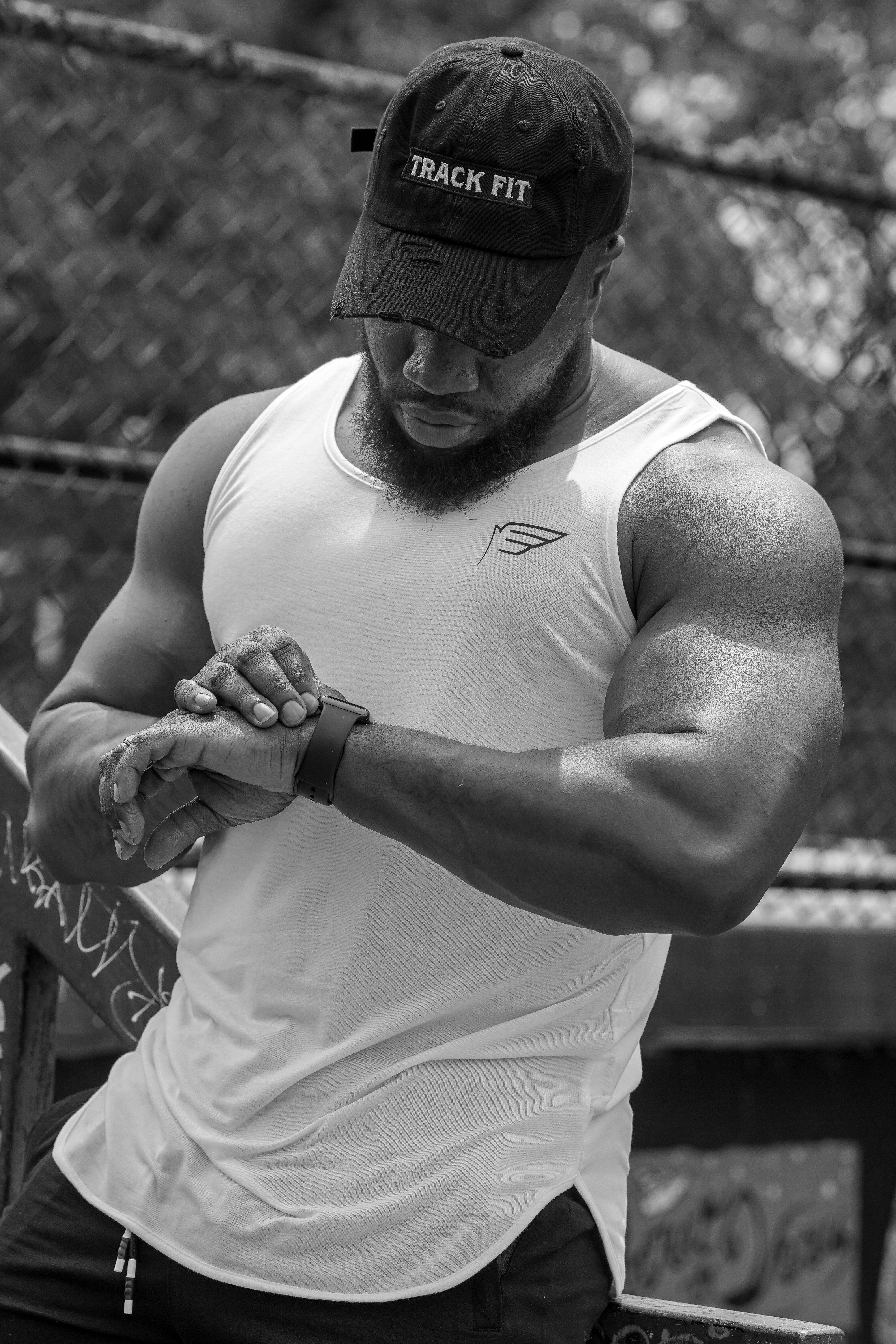 Grayscale Photo of a Man Looking at His Watch · Free Stock Photo