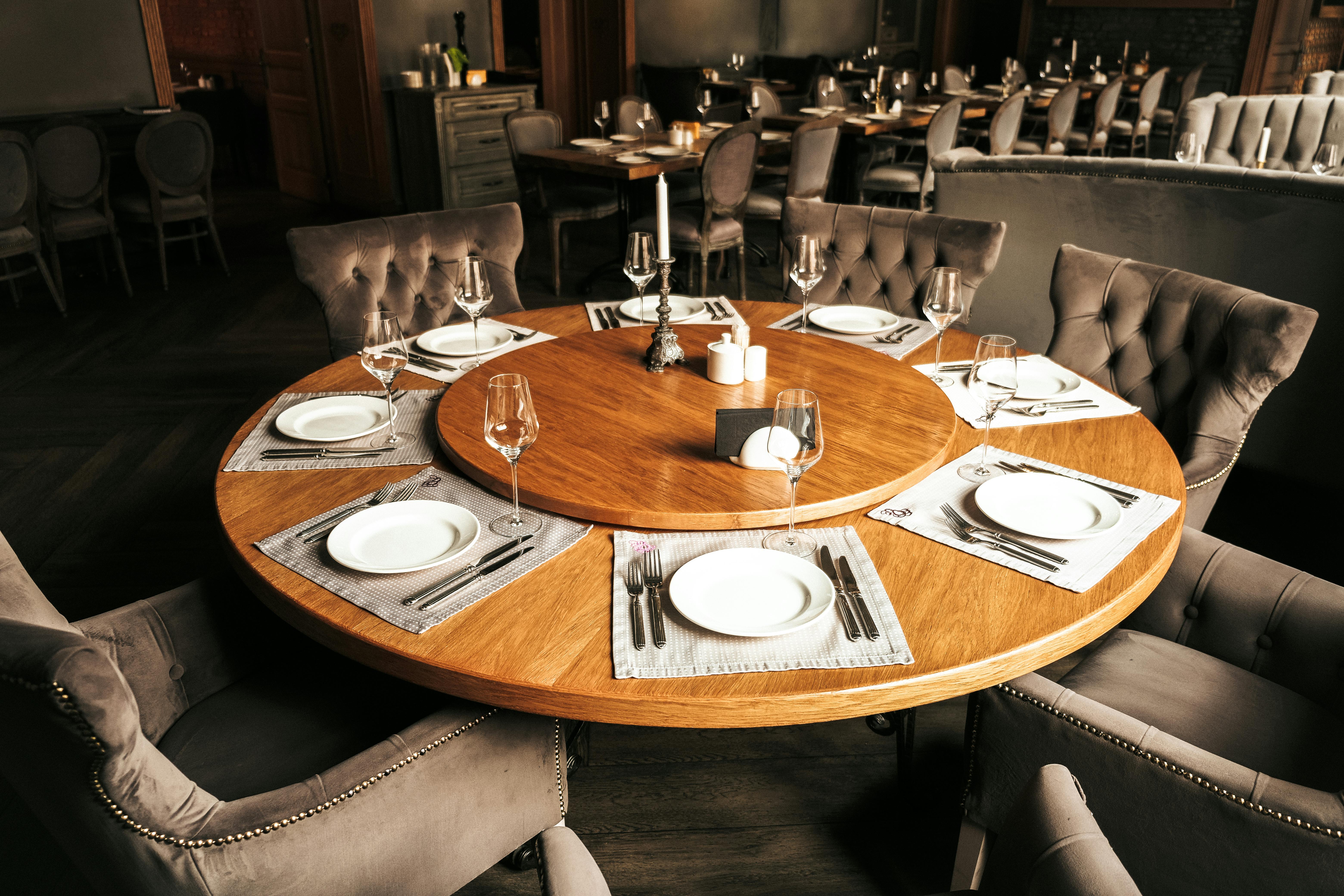 Plates on a Round Table · Free Stock Photo