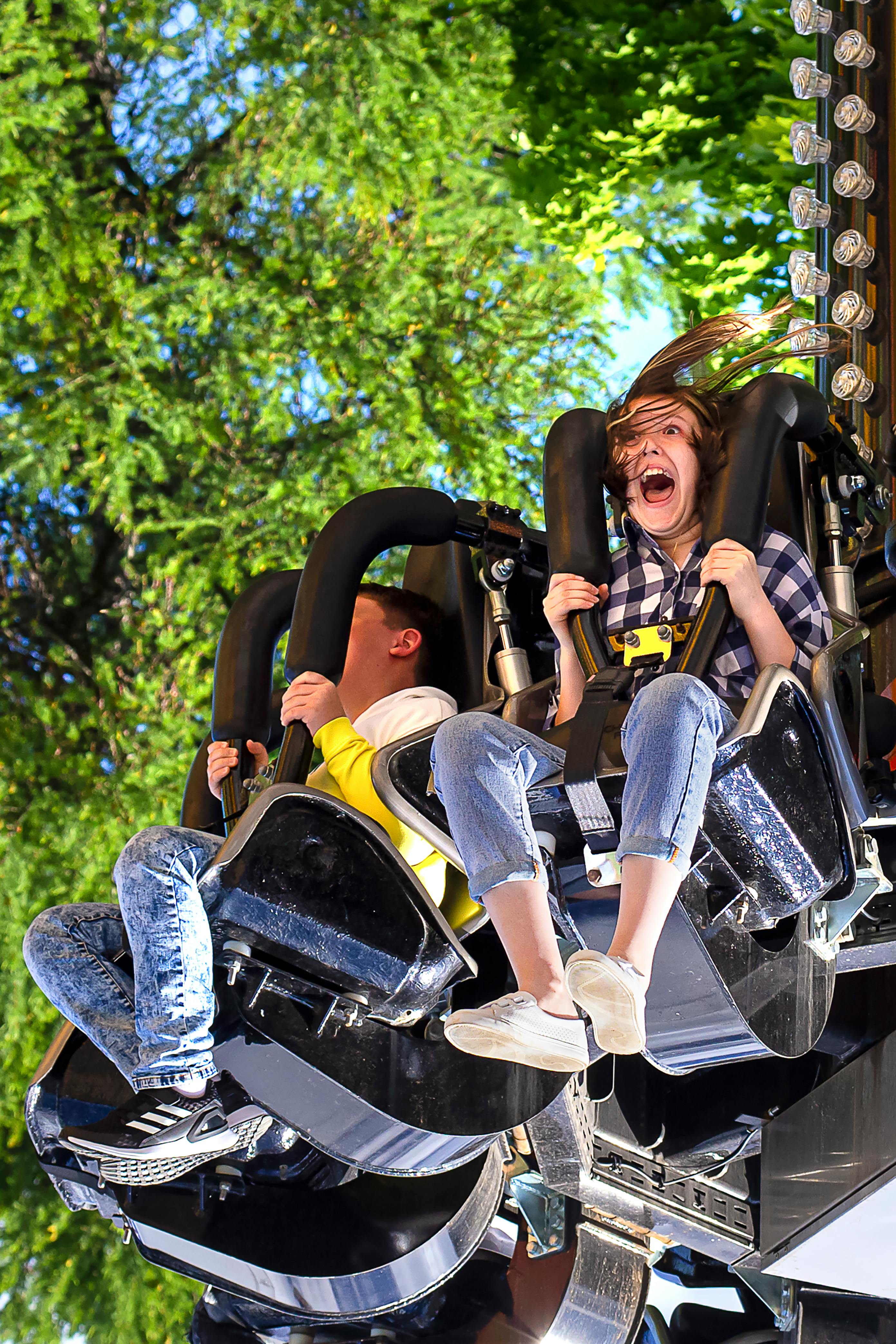 People riding an Amusement Ride · Free Stock Photo