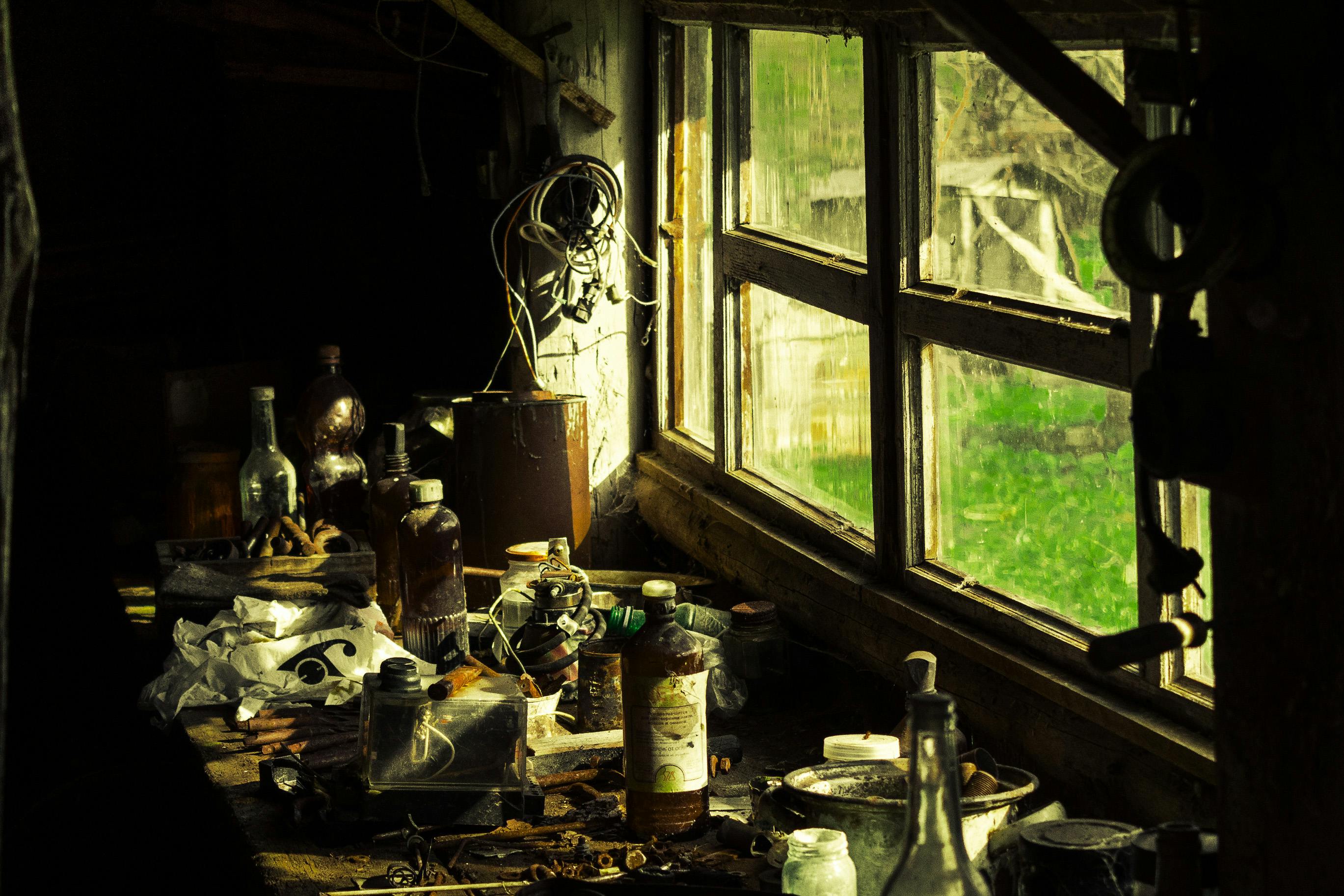 A Variety of Junk beside a Window · Free Stock Photo