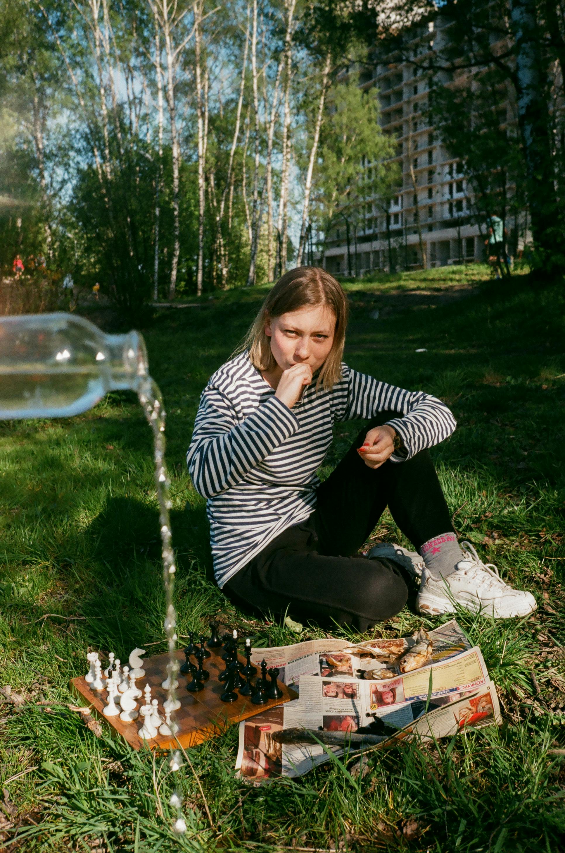 Woman Laying Down On Ground · Free Stock Photo