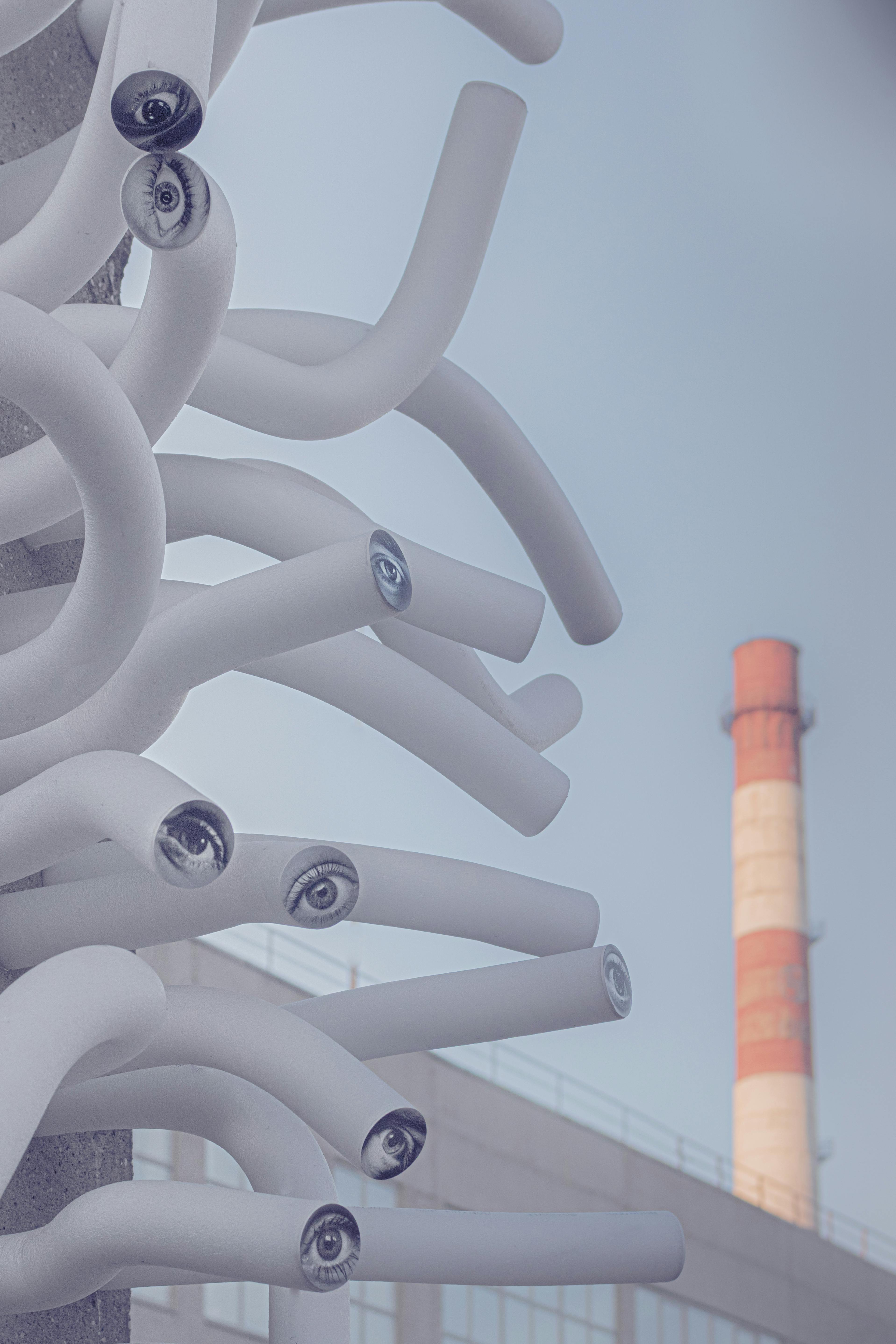 Drawings of Eyes on Pipes · Free Stock Photo