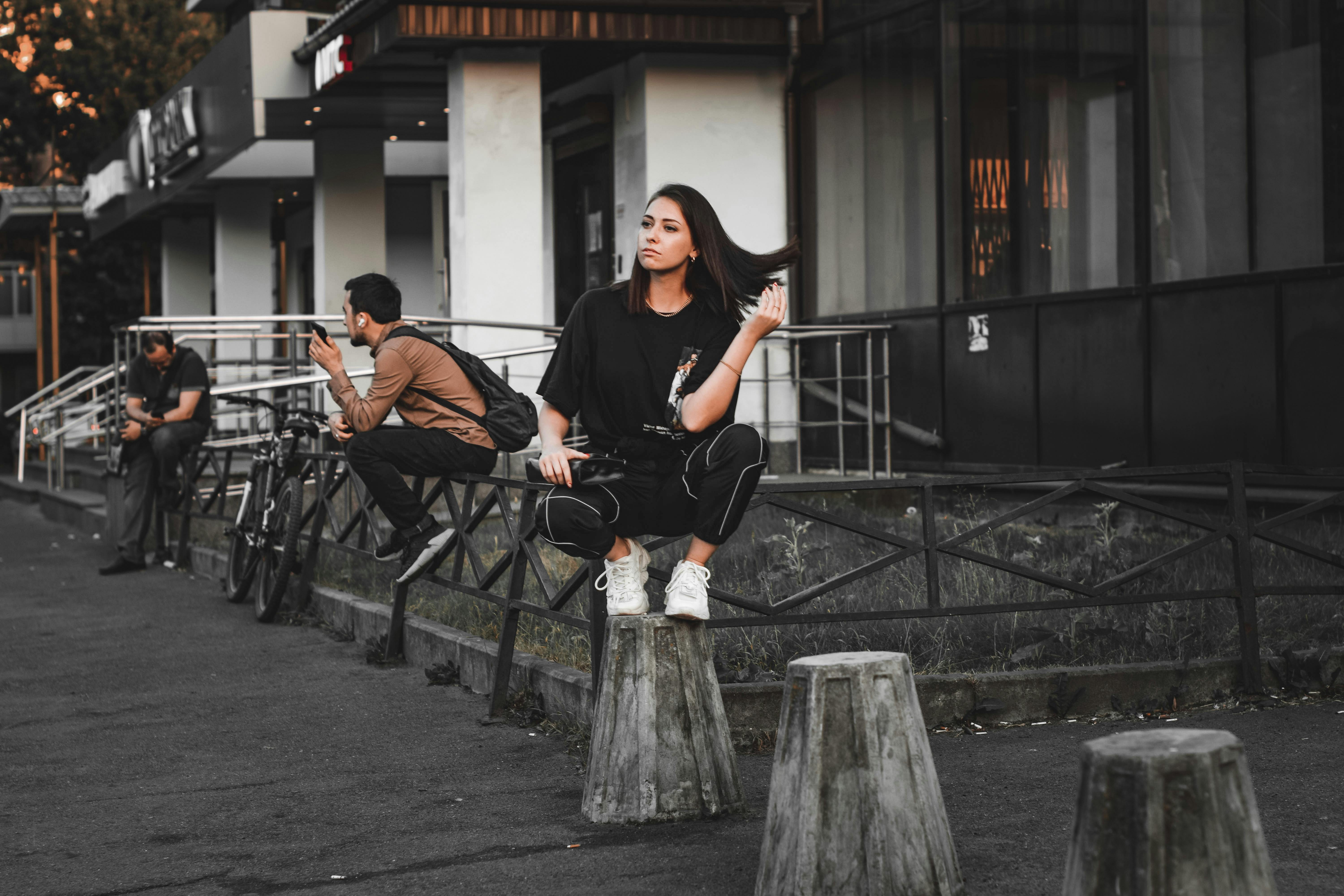 man Wearing a Costume Sitting on a Bench · Free Stock Photo