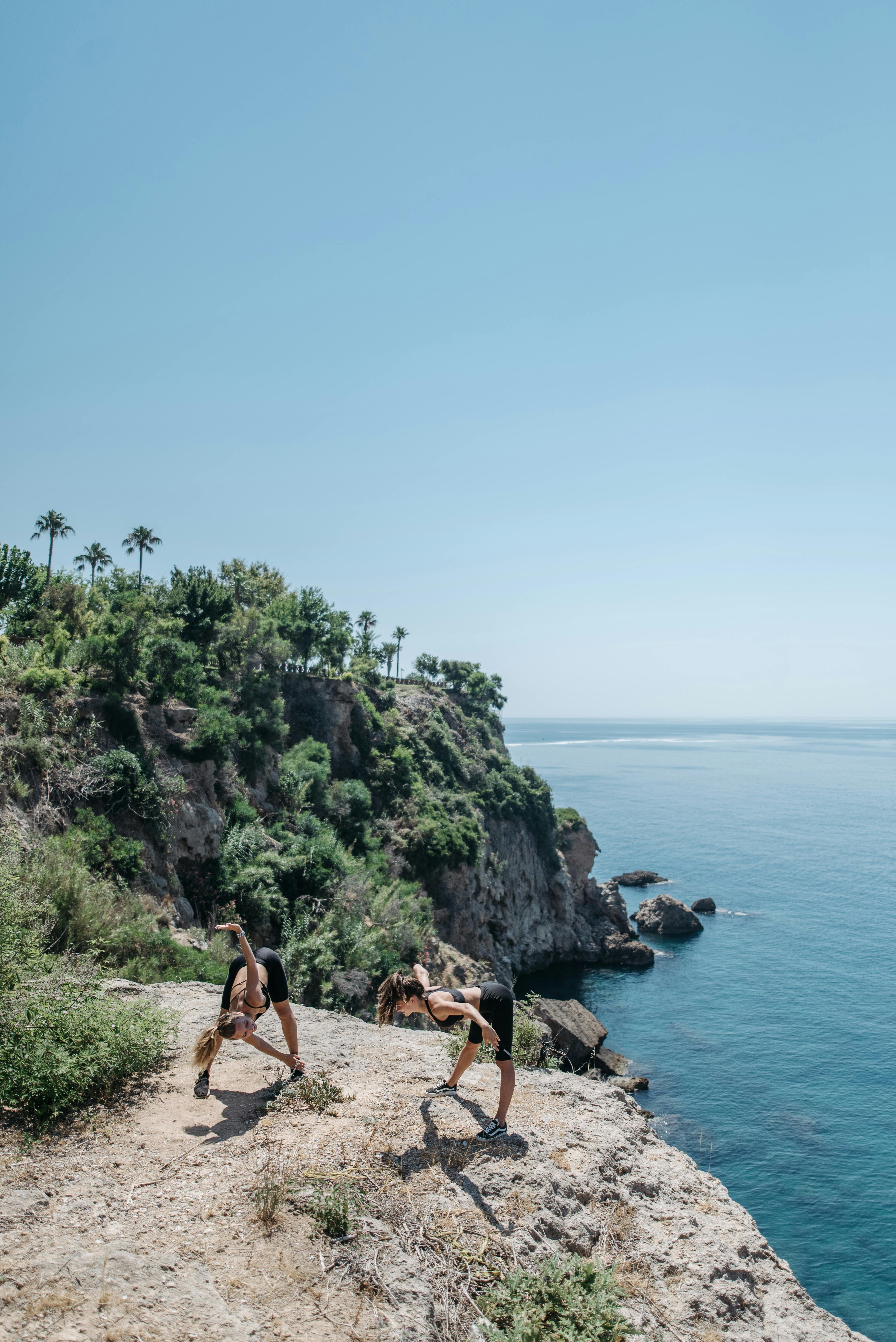 Women Doing Workout on a Cliff · Free Stock Photo