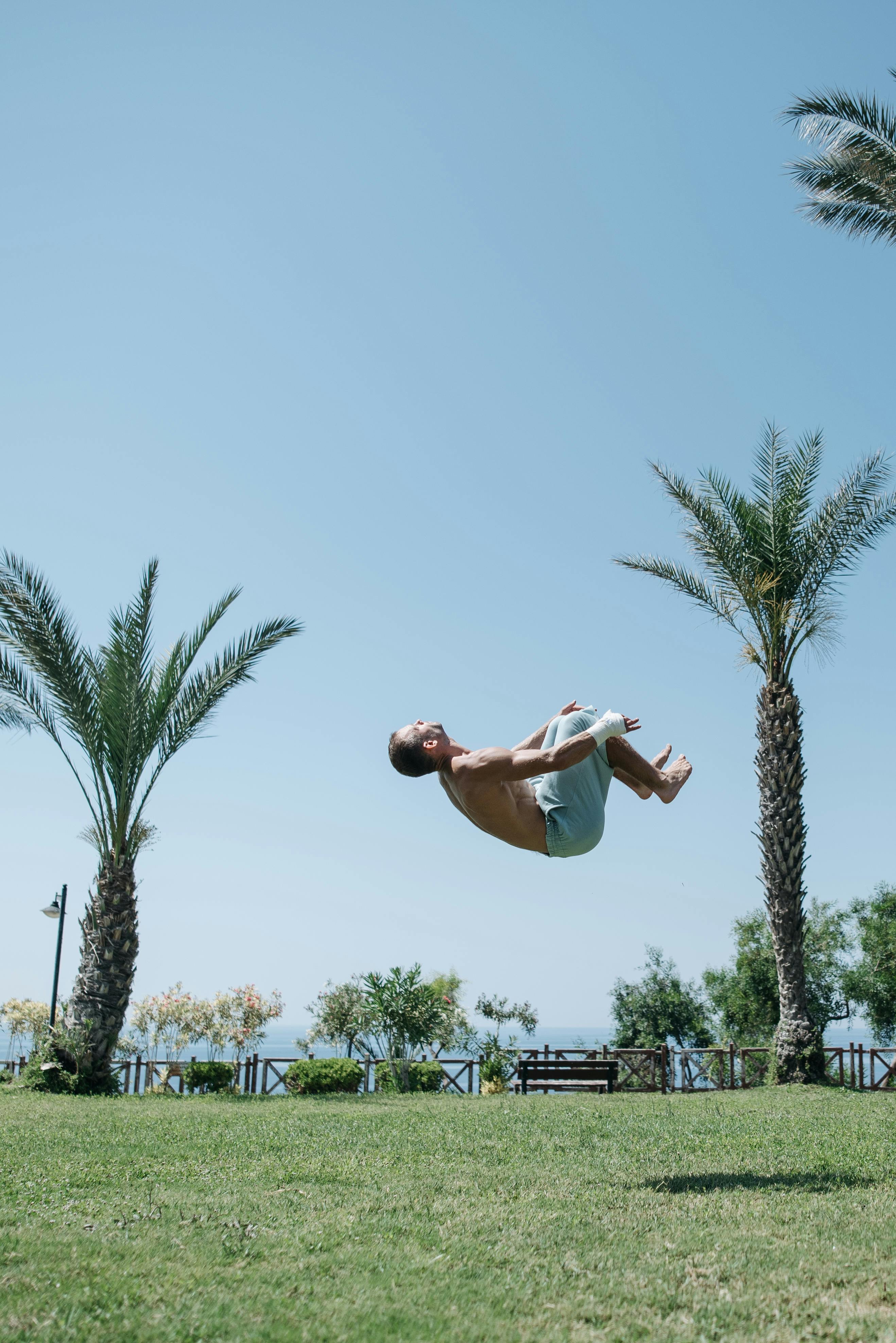 A Man Doing a Backflip · Free Stock Photo