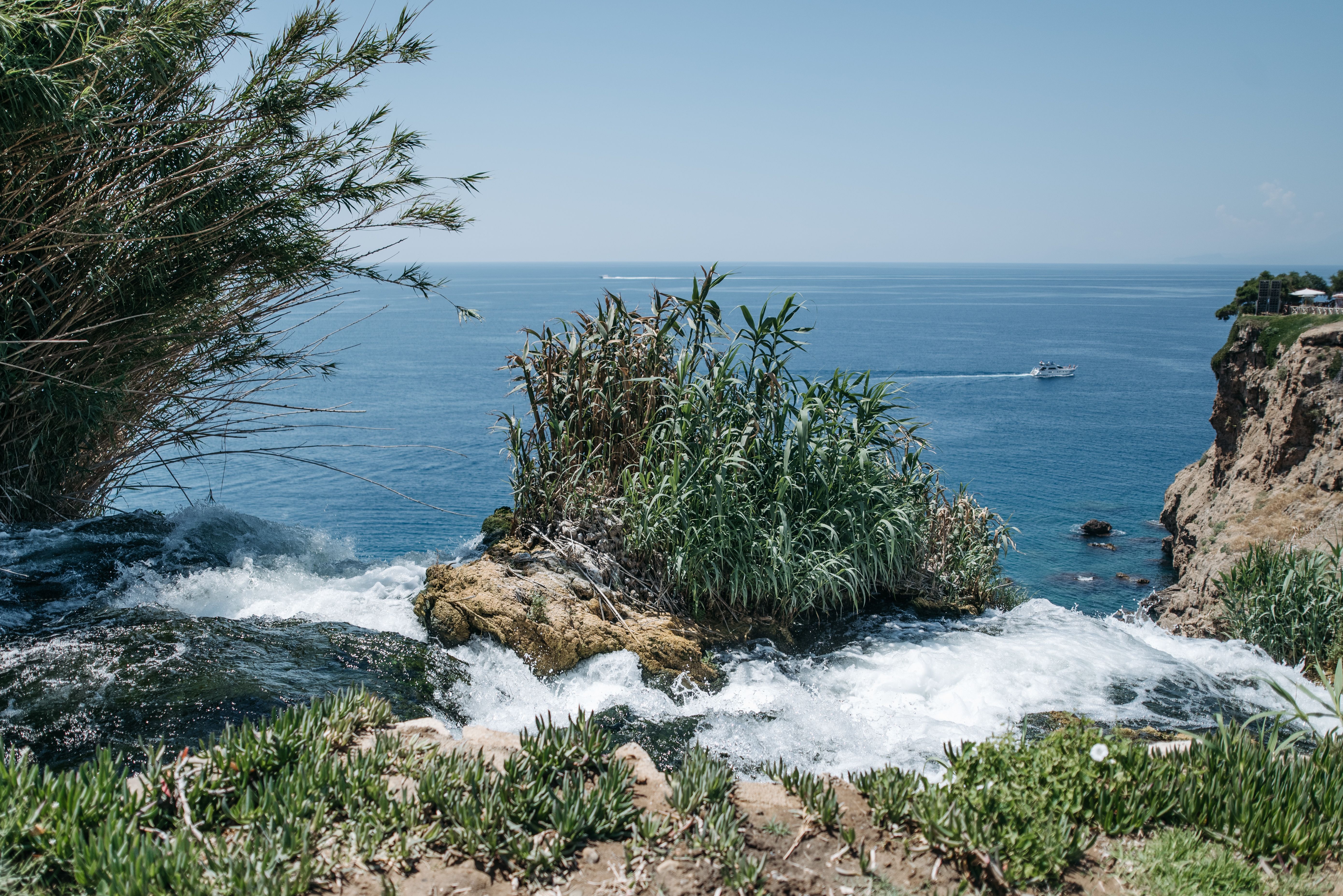 A Waterfall Flowing Down the Sea · Free Stock Photo