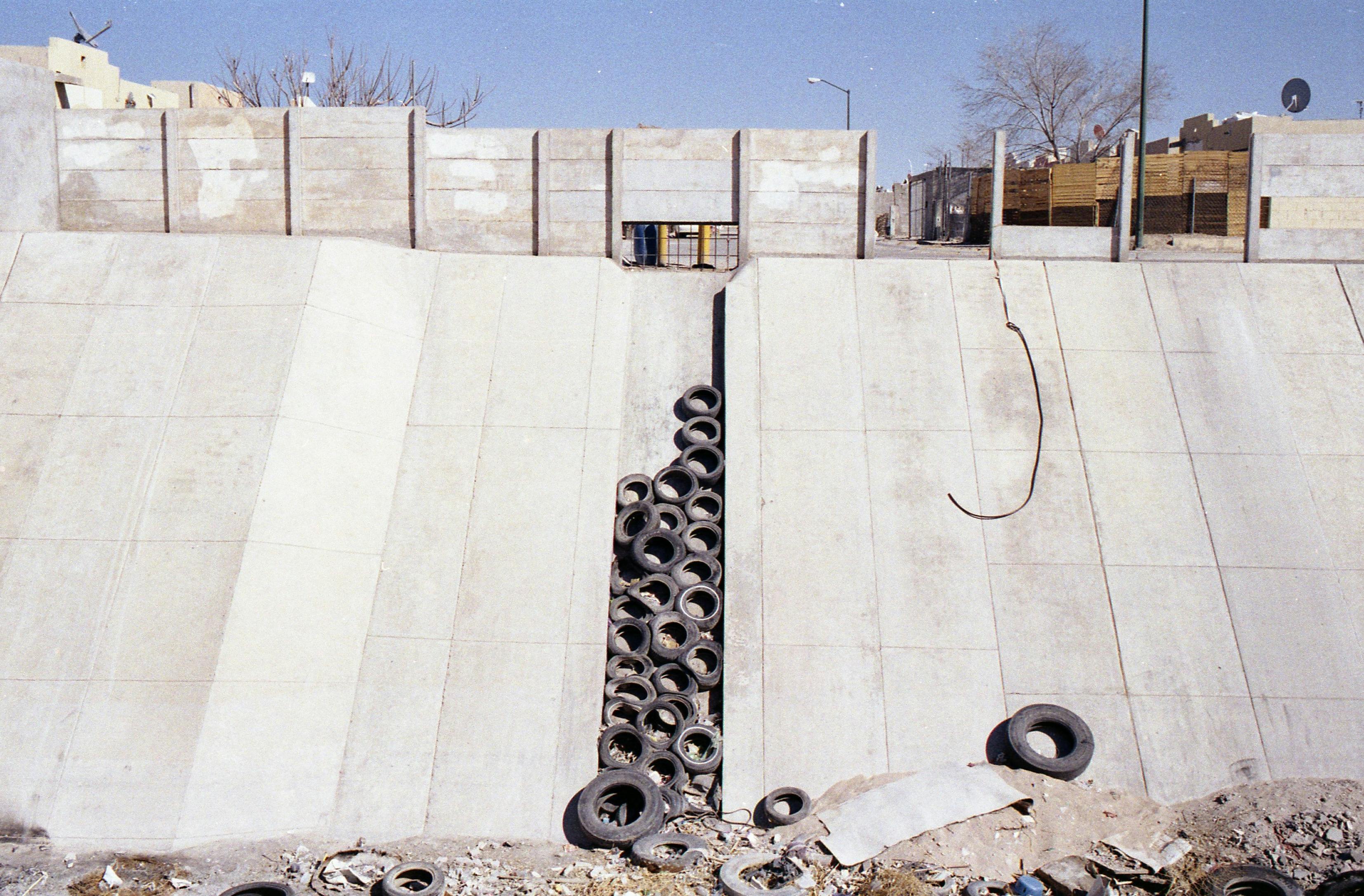 Persons Left Hand on White Wall · Free Stock Photo