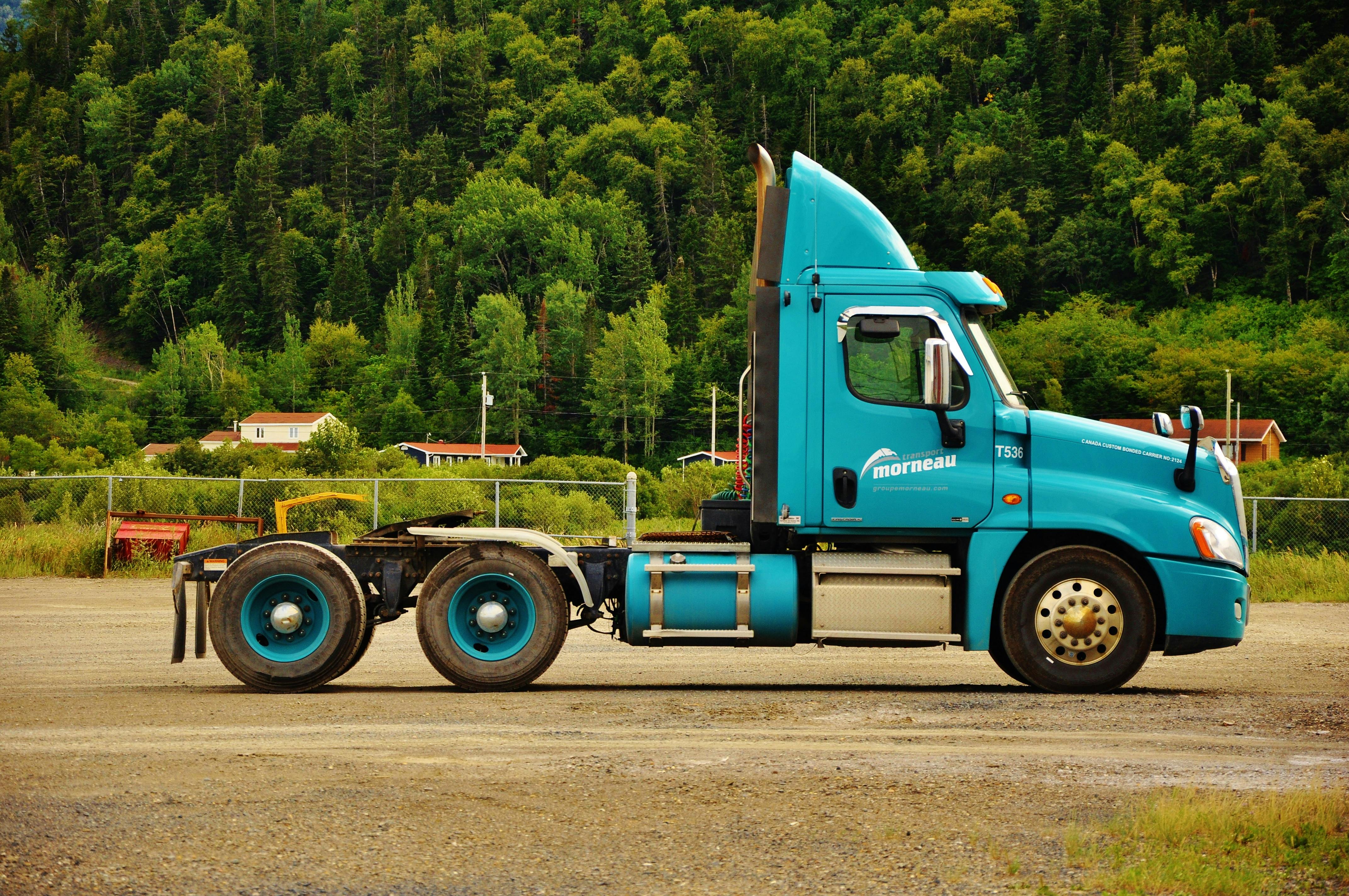 Side View of a Blue Truck · Free Stock Photo