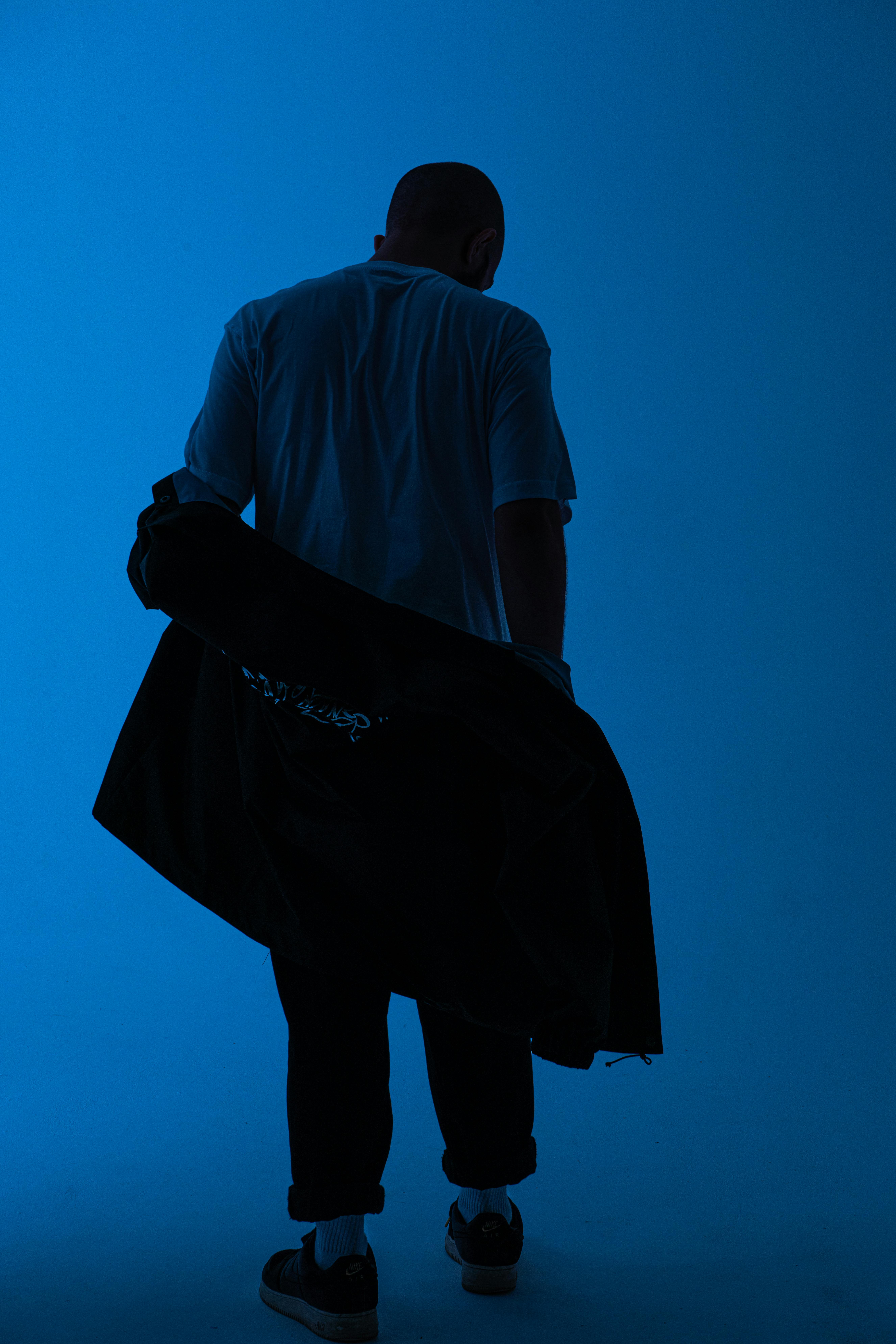 Back View of a Man with a Jacket · Free Stock Photo