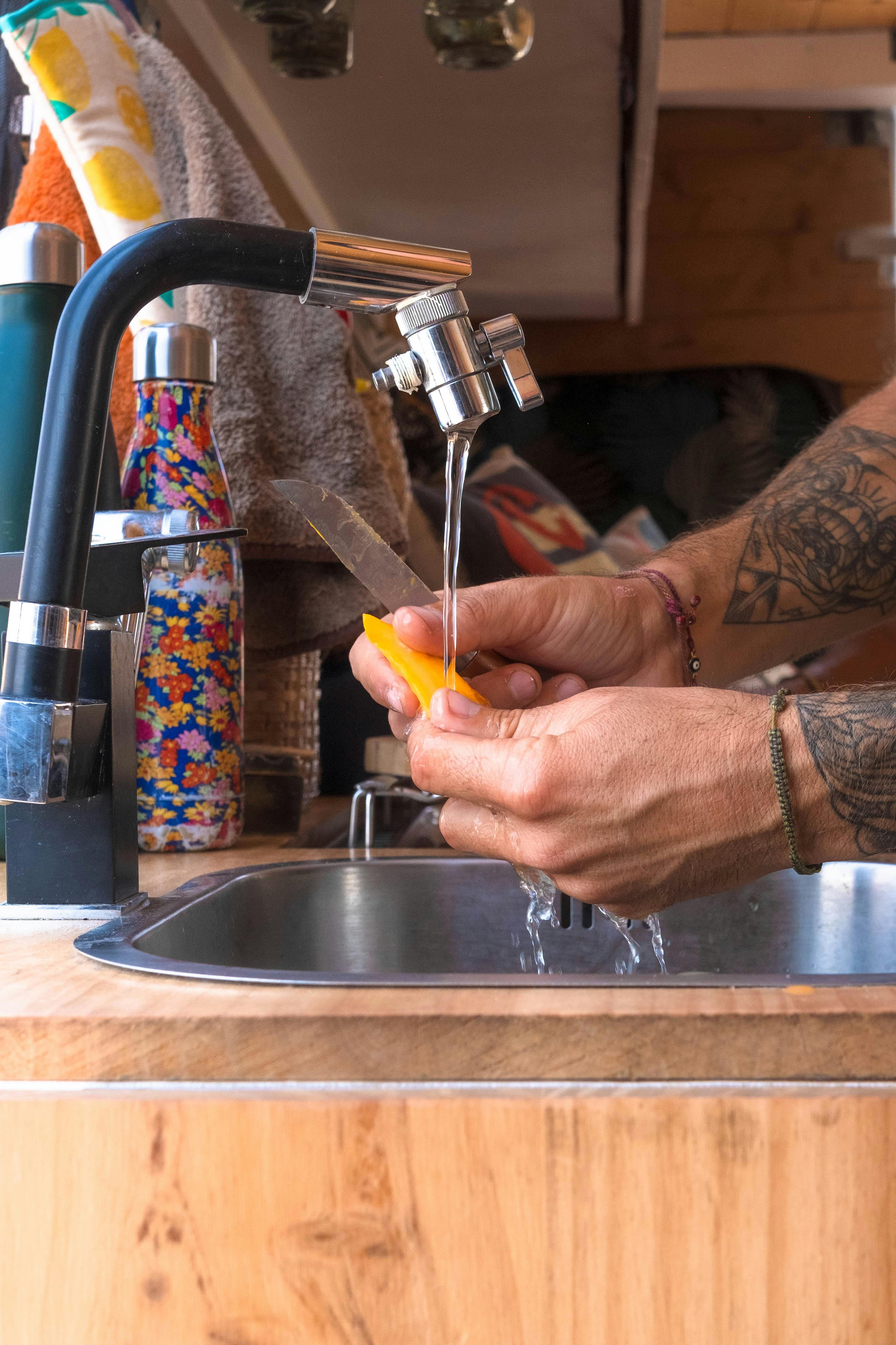Person washing his Hands on a Sink · Free Stock Photo