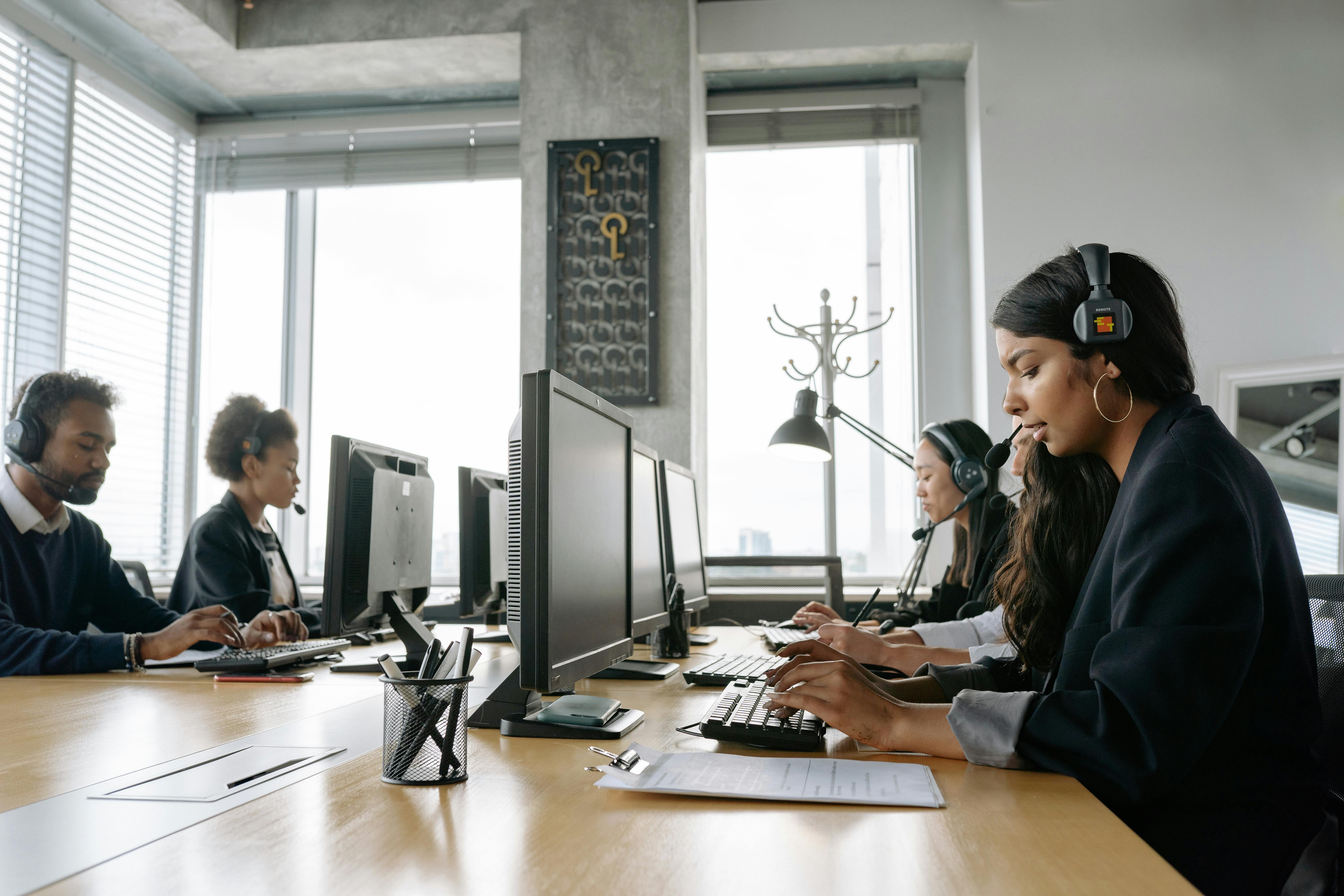 People Sitting in Front of Computers · Free Stock Photo