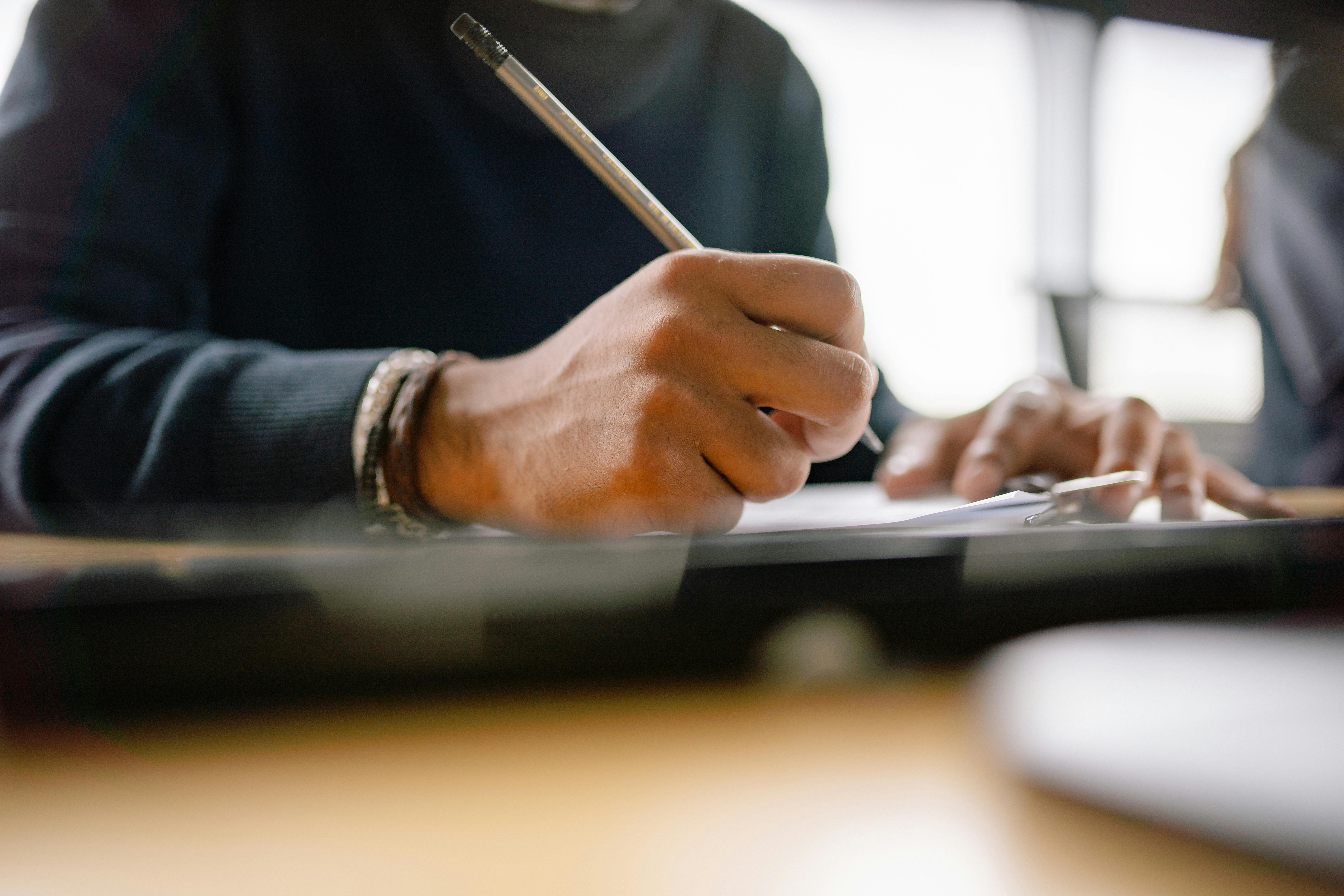 Man Drawing Mountain and Trees · Free Stock Photo