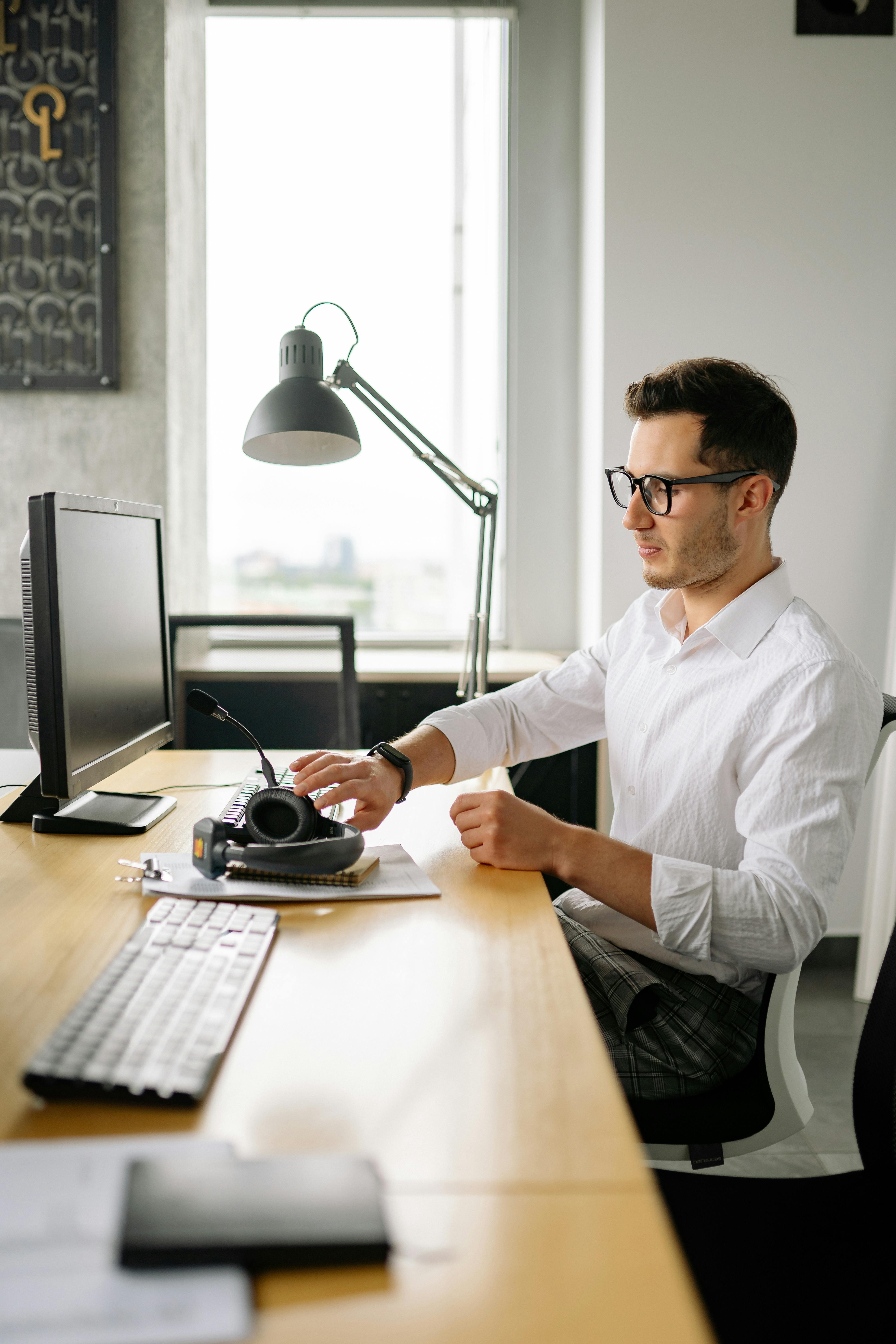 Woman and Man Sitting Facing Table · Free Stock Photo