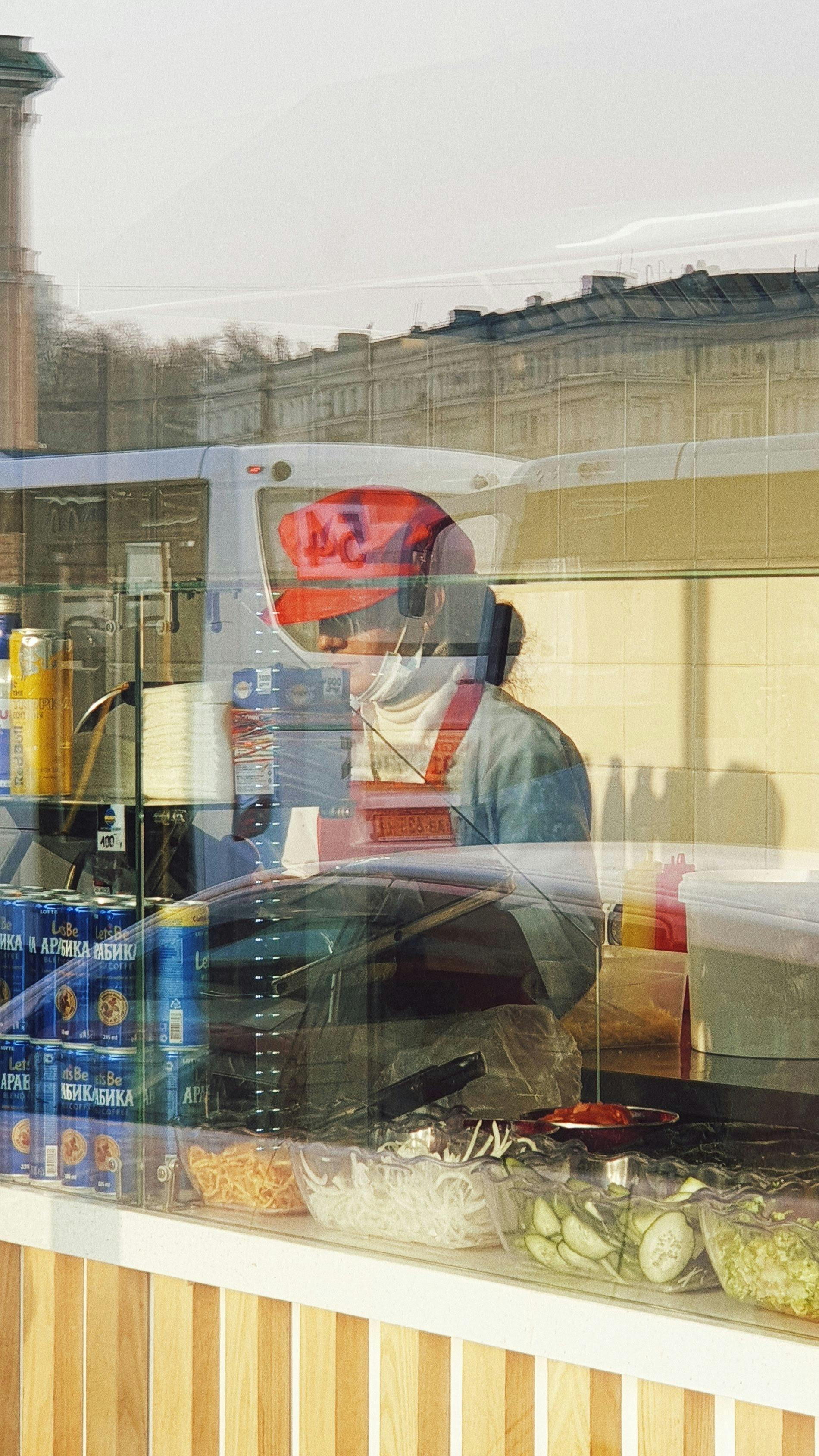Client leaning on a Counter Top · Free Stock Photo