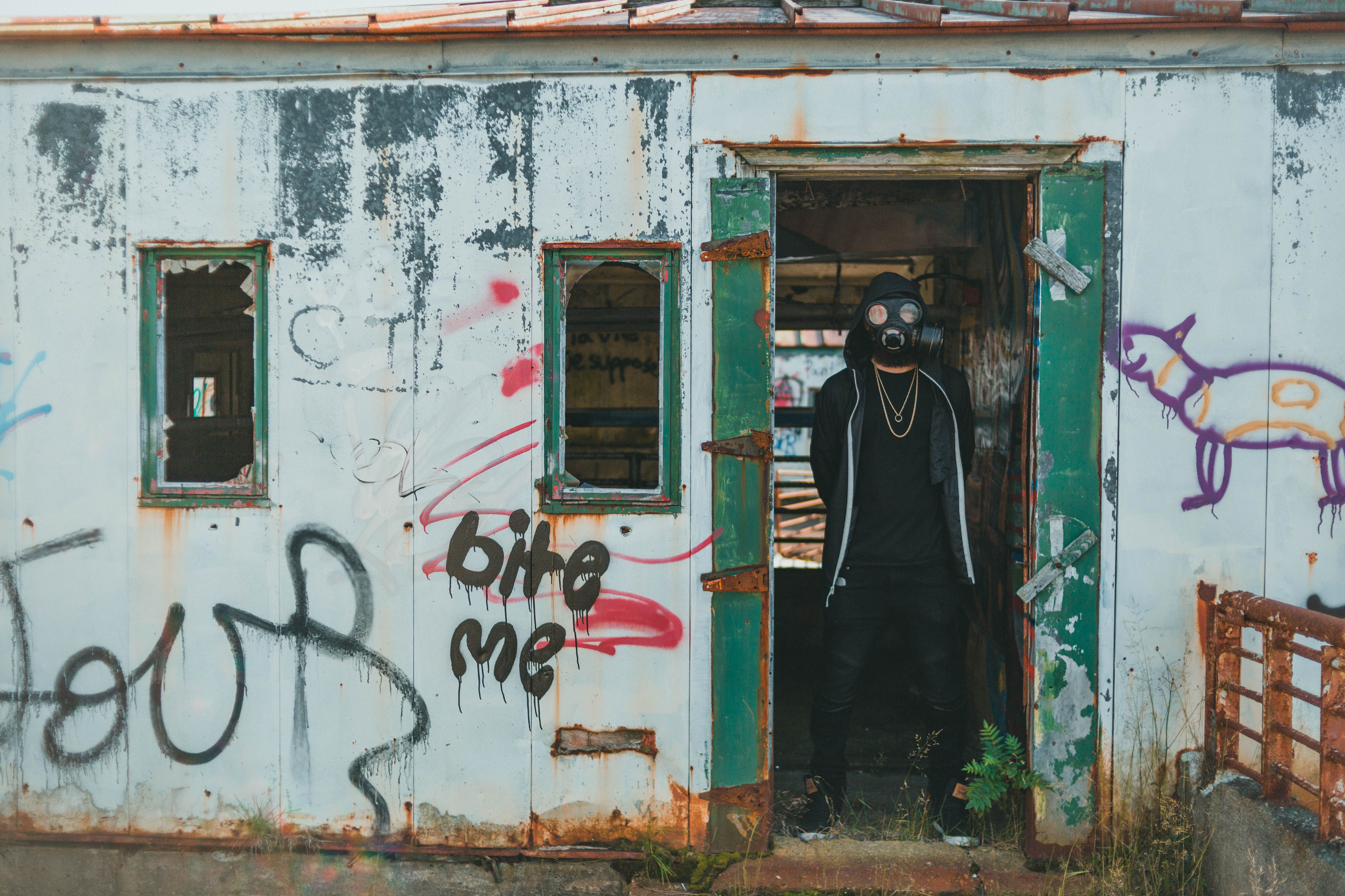 Man Inside Abandoned Building Free Stock Photo