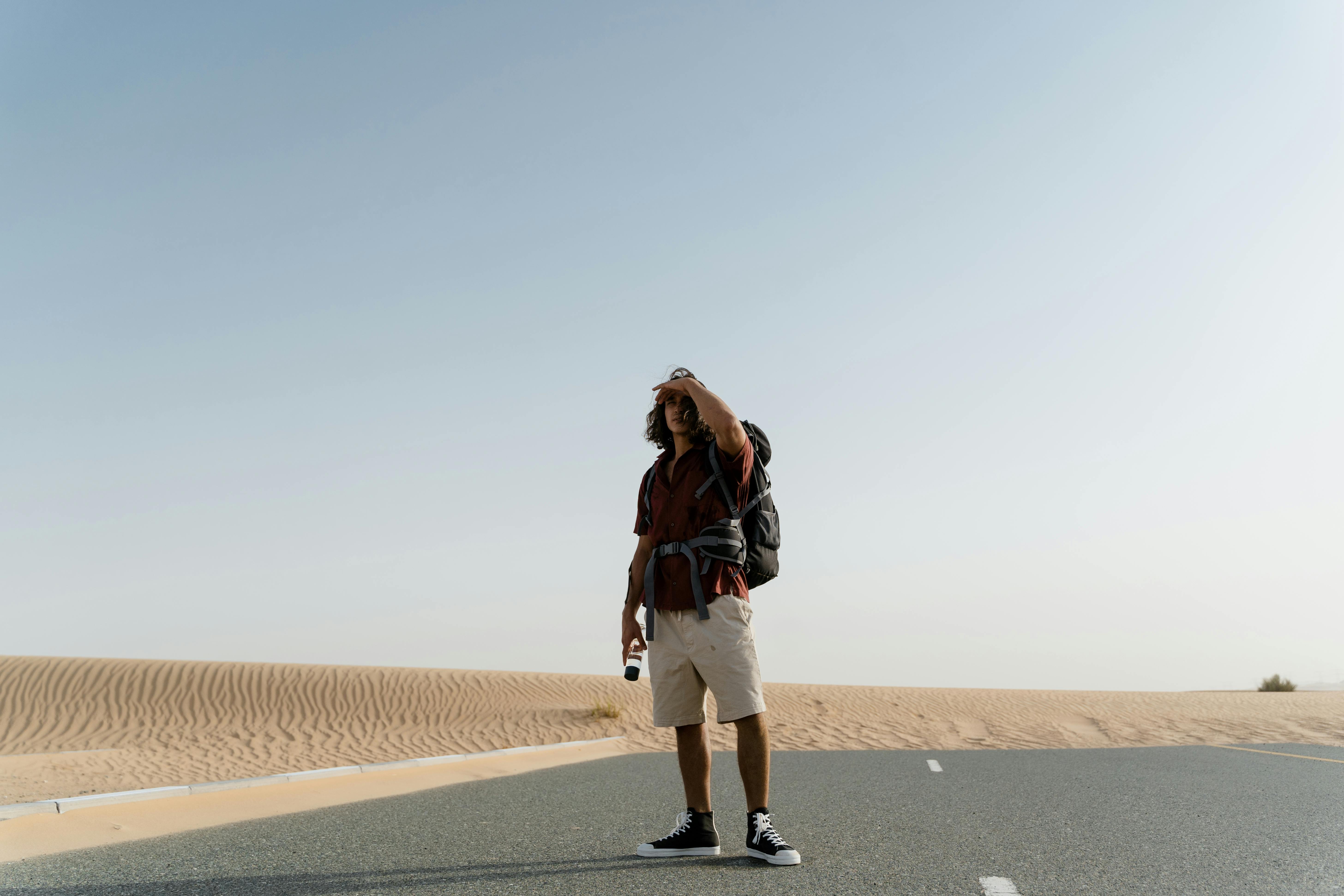 A Man Standing on the Road · Free Stock Photo