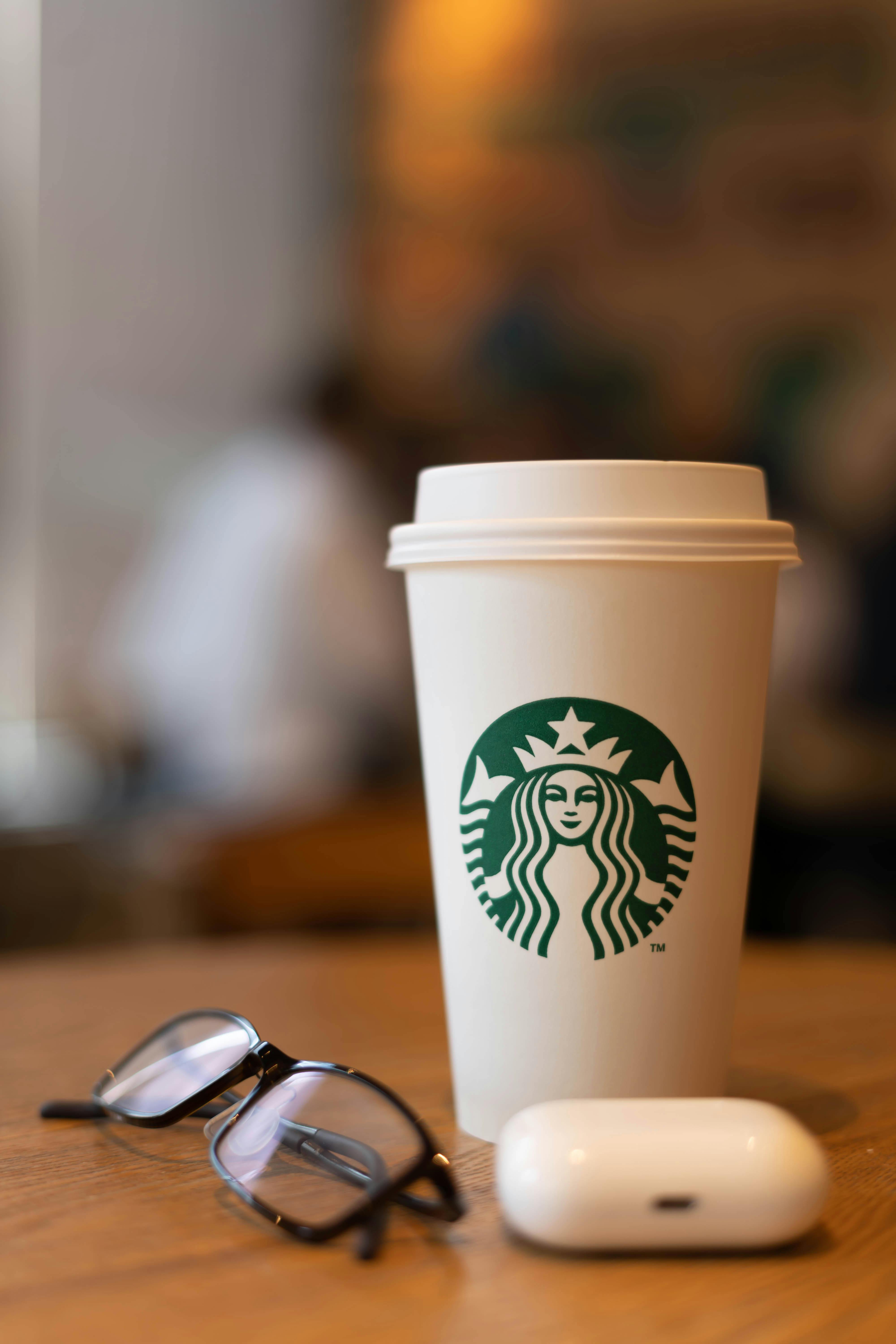 Photo of Coffee Cup on Wooden Surface · Free Stock Photo