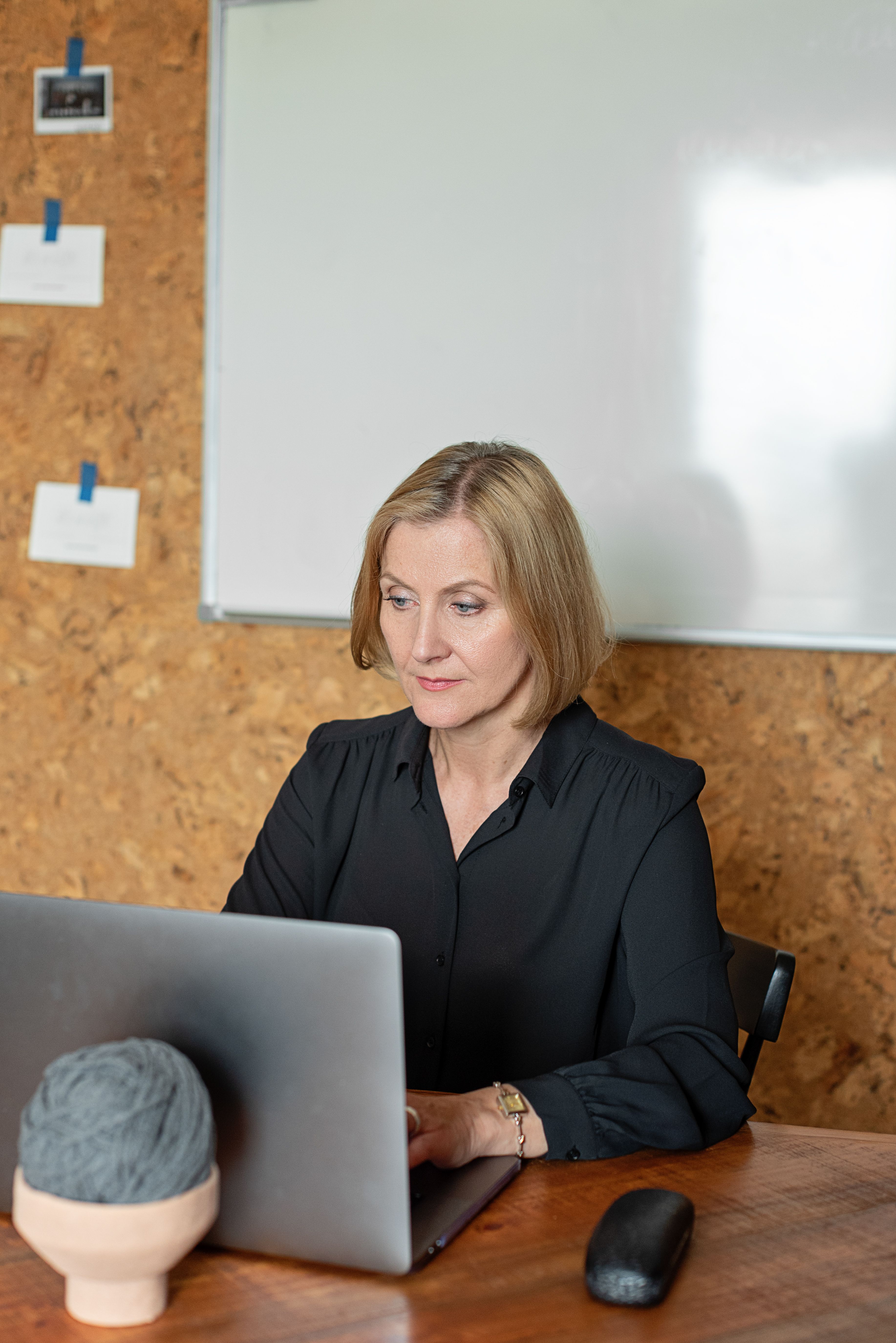 Woman in Front of a Laptop Computer · Free Stock Photo
