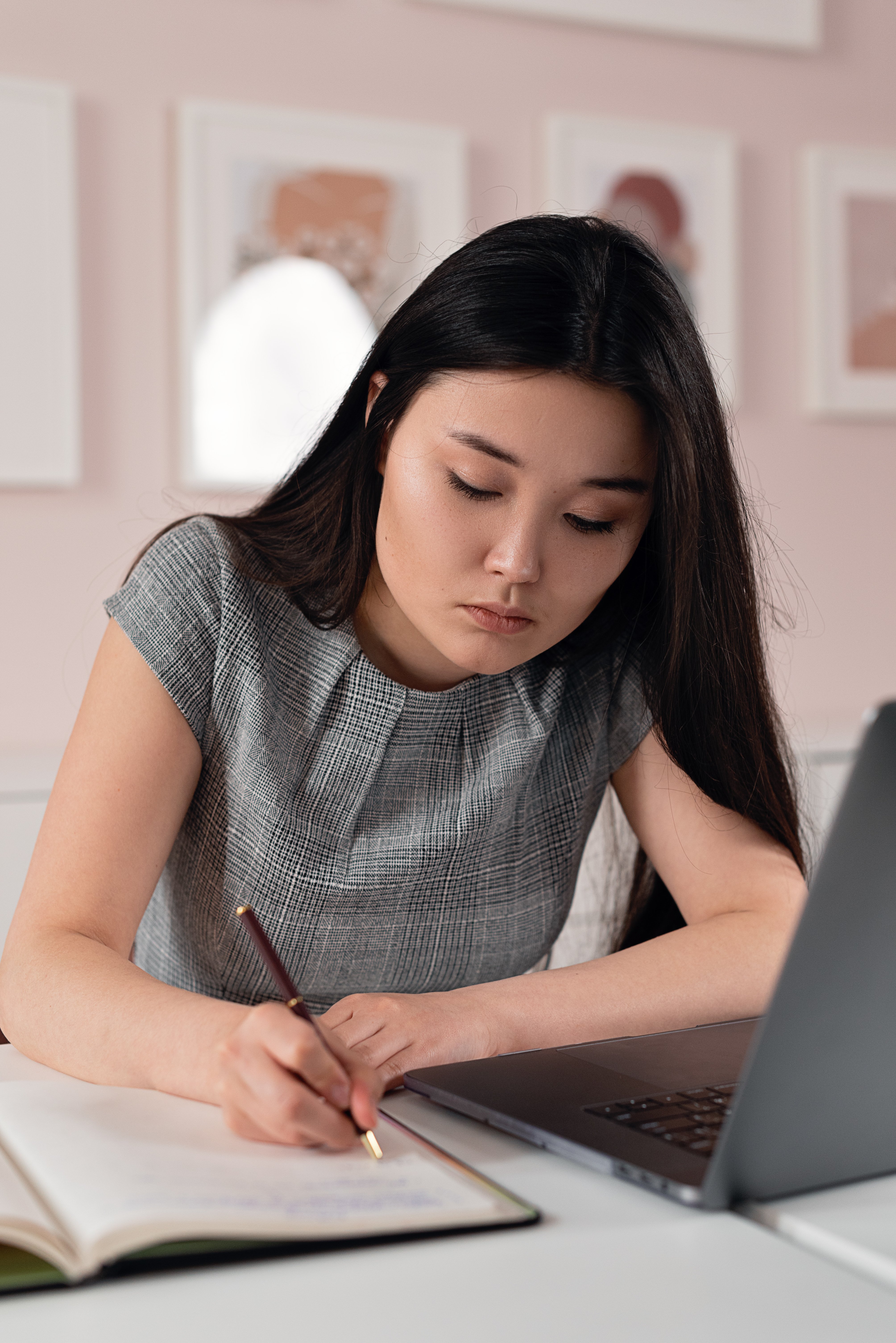 Person Using Laptop Computer on Table · Free Stock Photo