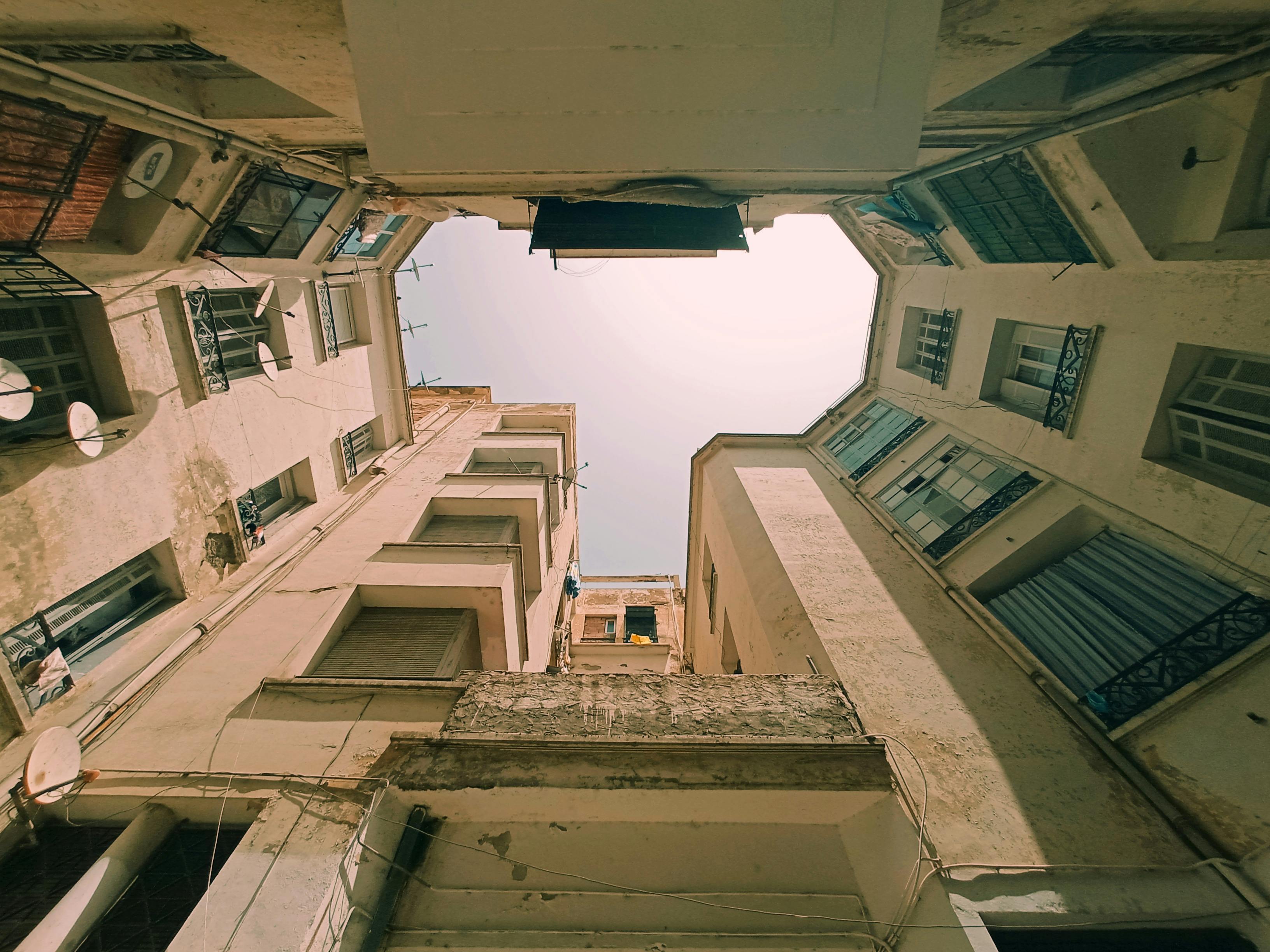 Low-Angle Shot of a Concrete Building · Free Stock Photo