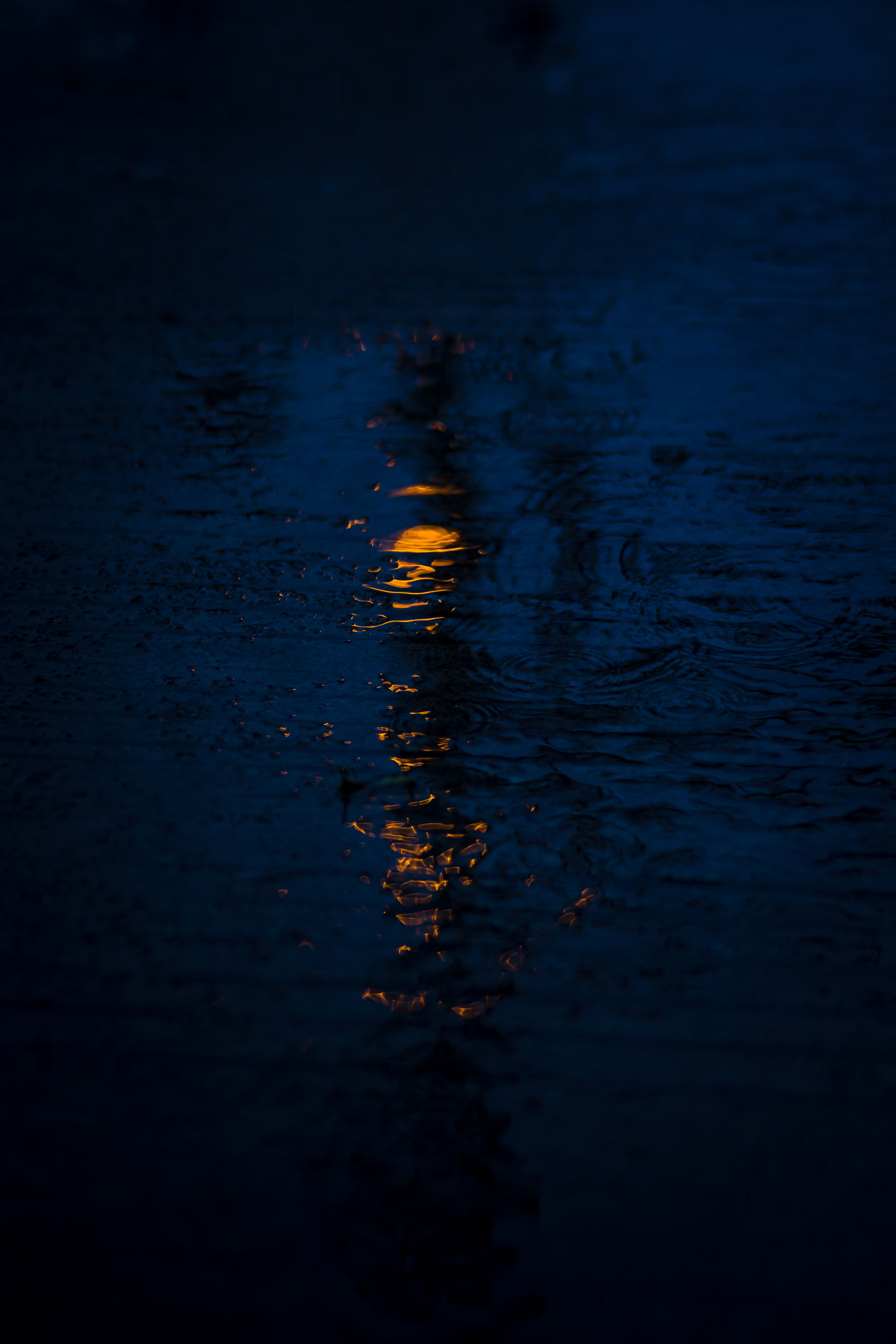 Paper Boat on Puddle on Plastic Chair · Free Stock Photo