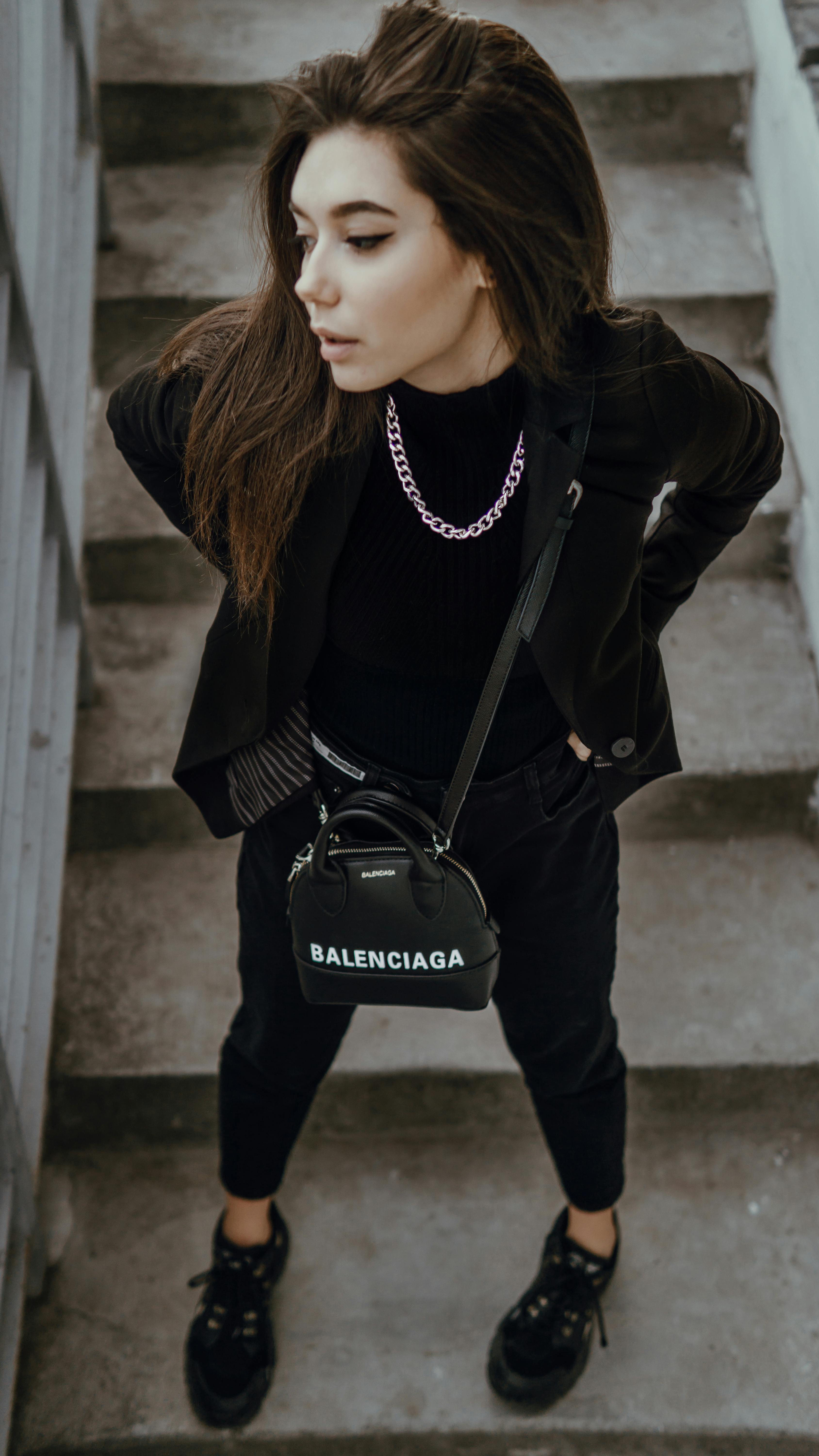 Person Presenting Paperwork · Free Stock Photo