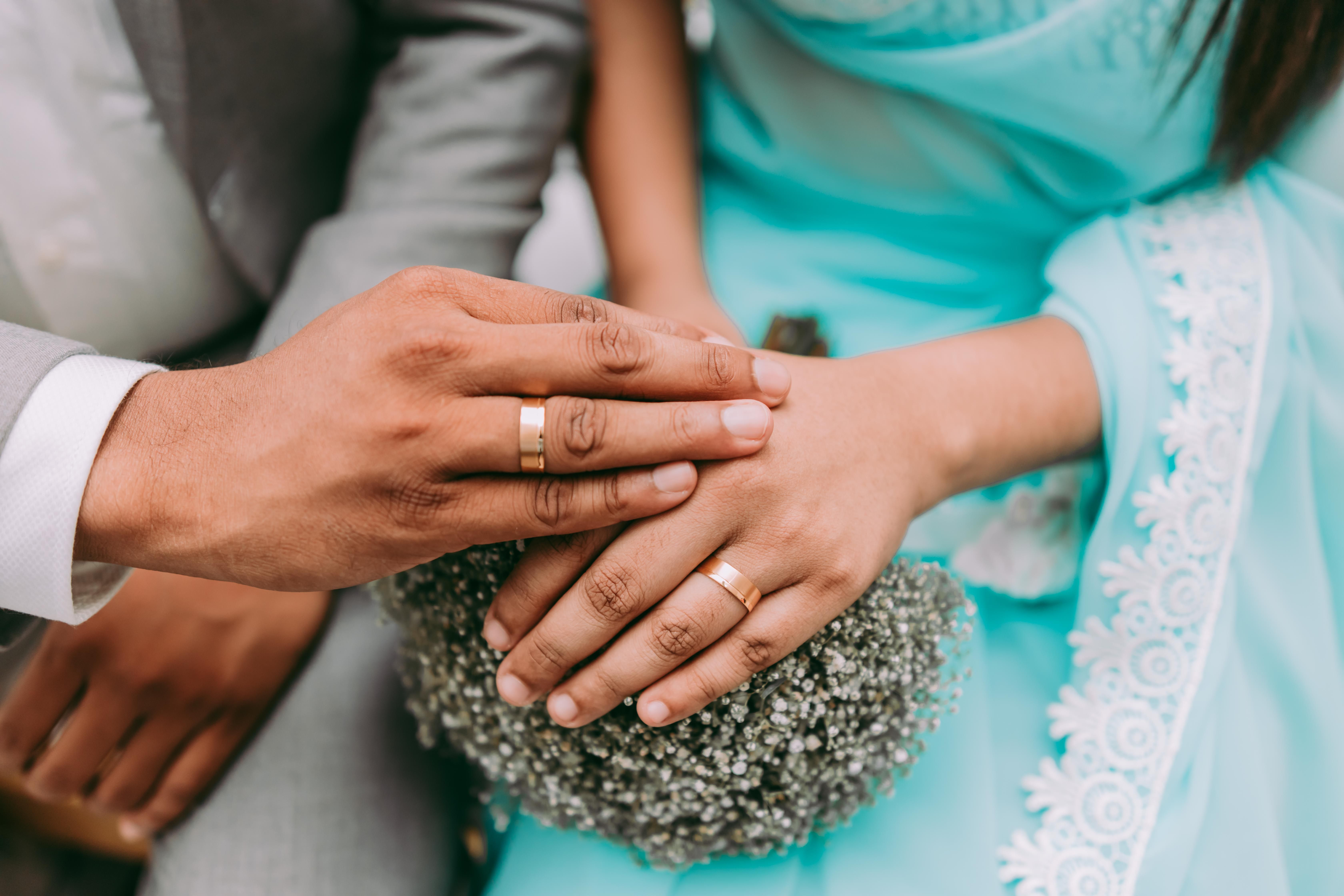 A Person Wearing Gold Ring · Free Stock Photo