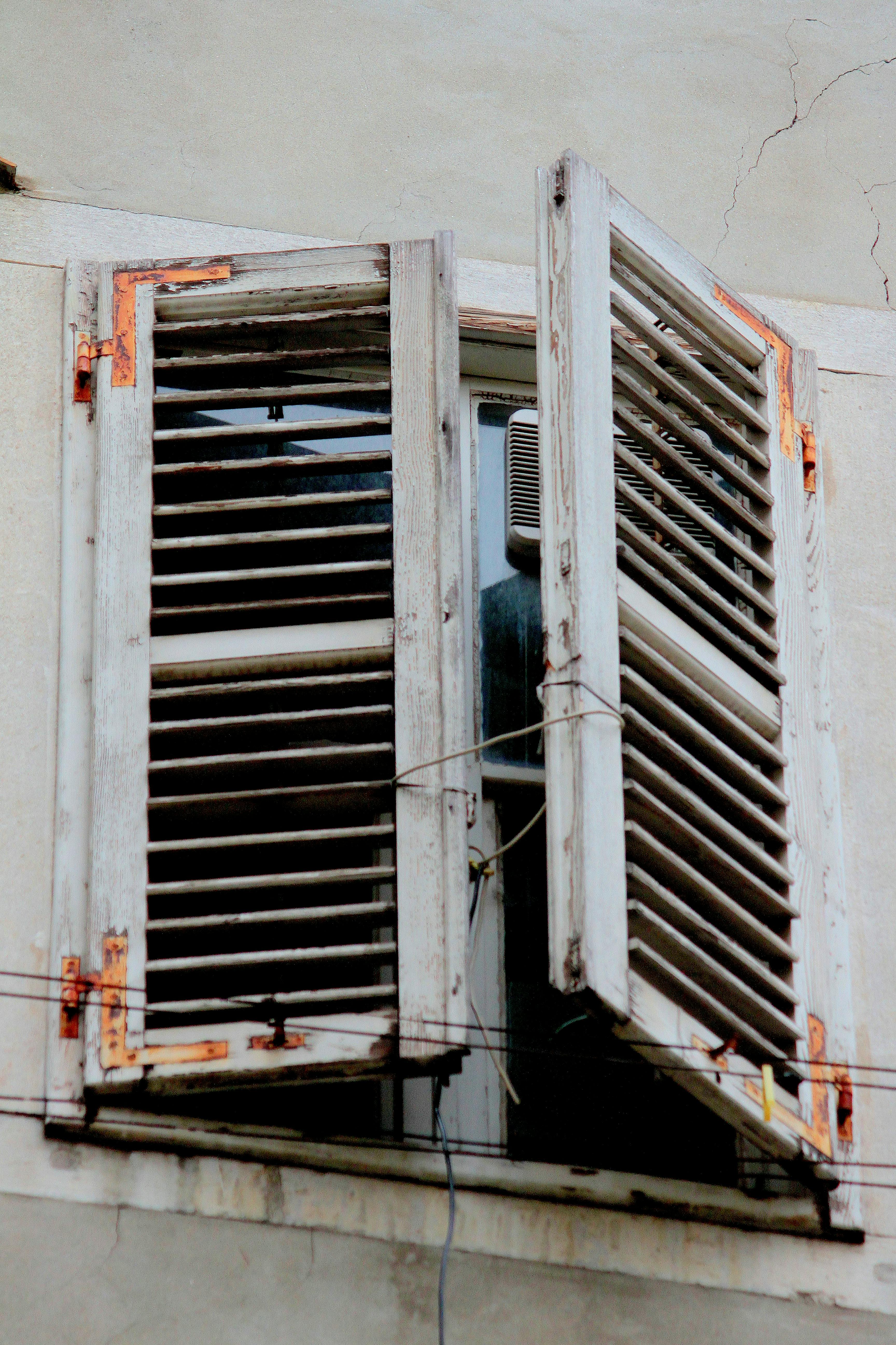 Photo of a Window with Wires · Free Stock Photo