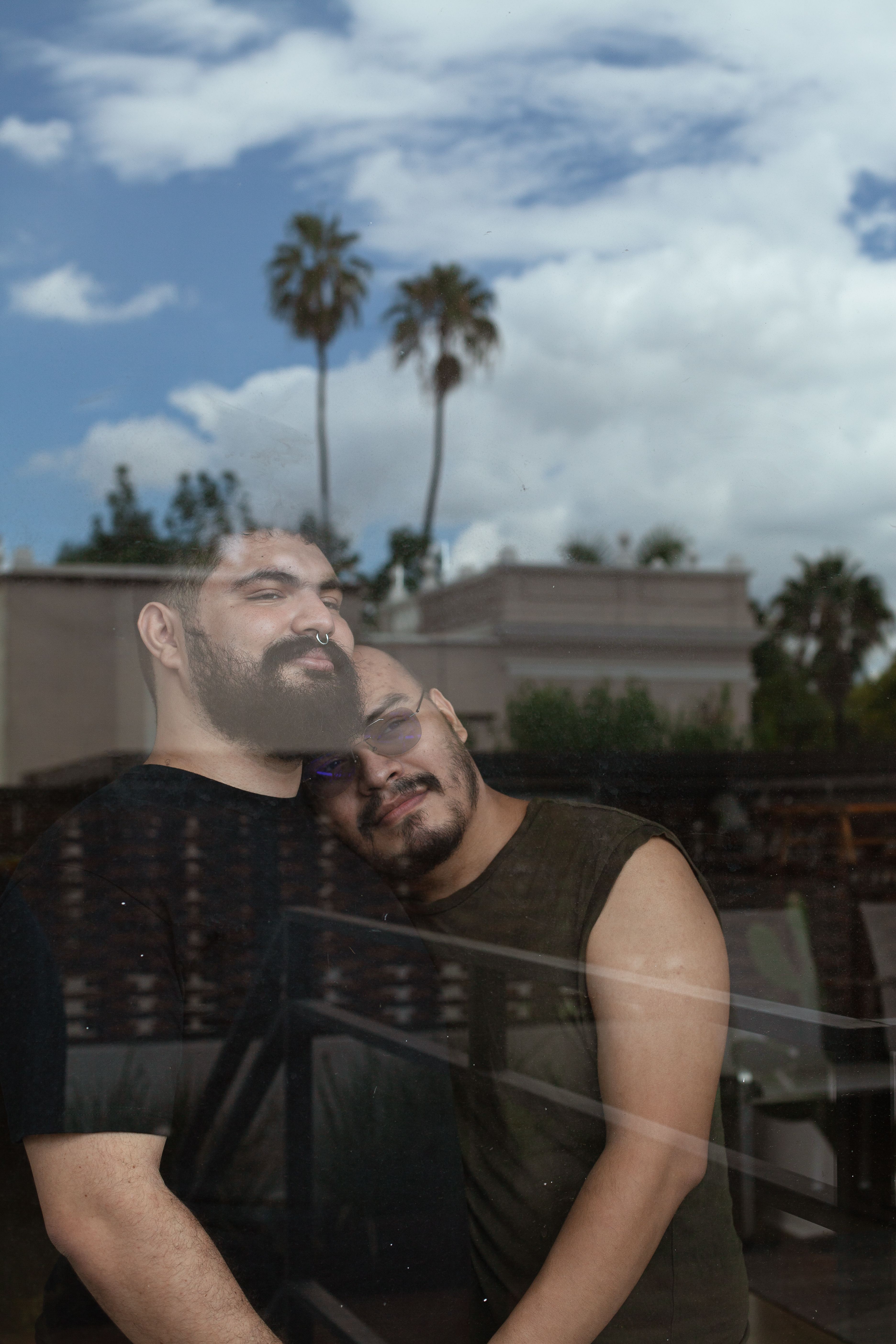 Two Men In Bed Cuddling · Free Stock Photo