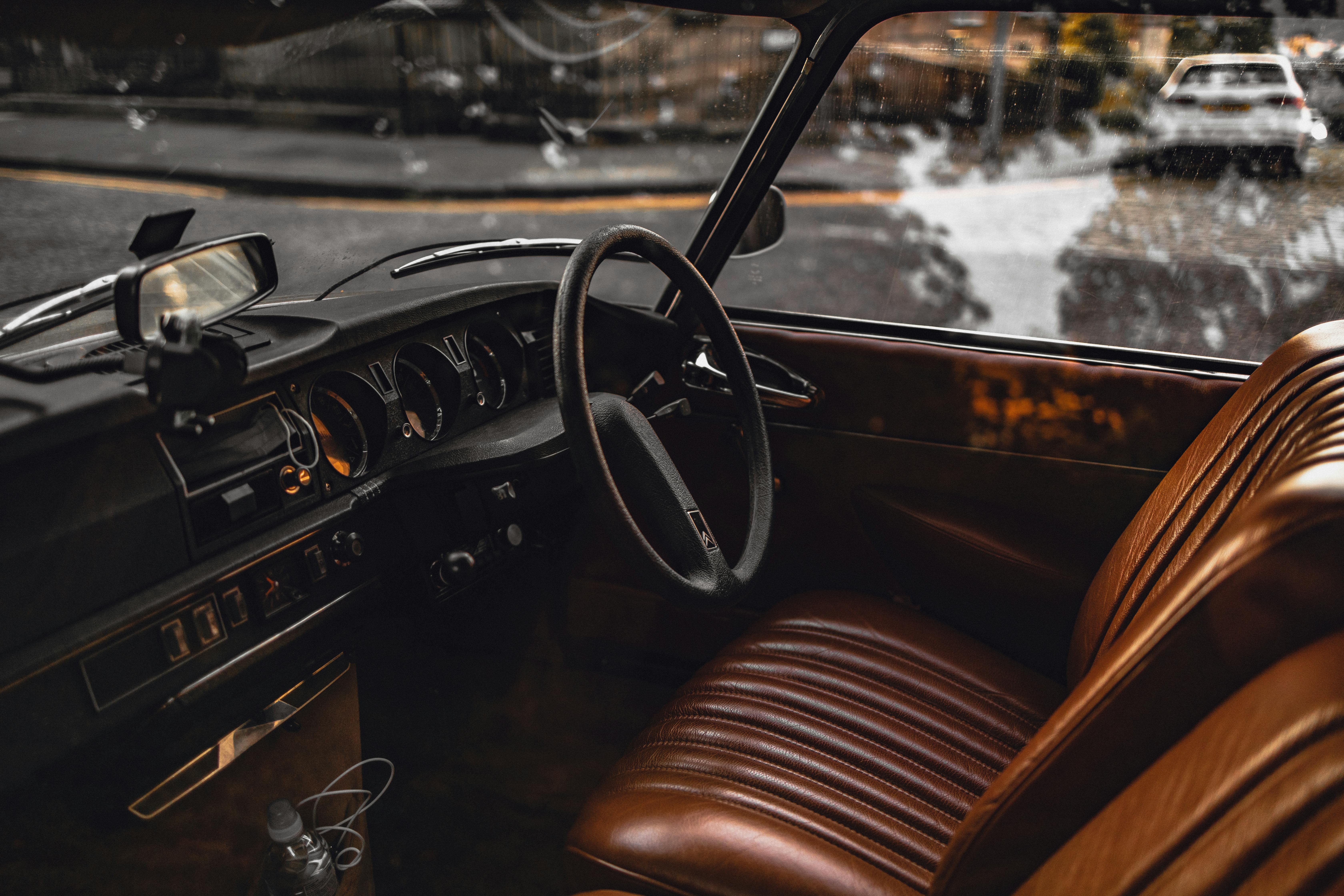 Interior of a Vintage Car with Leather Seats · Free Stock Photo