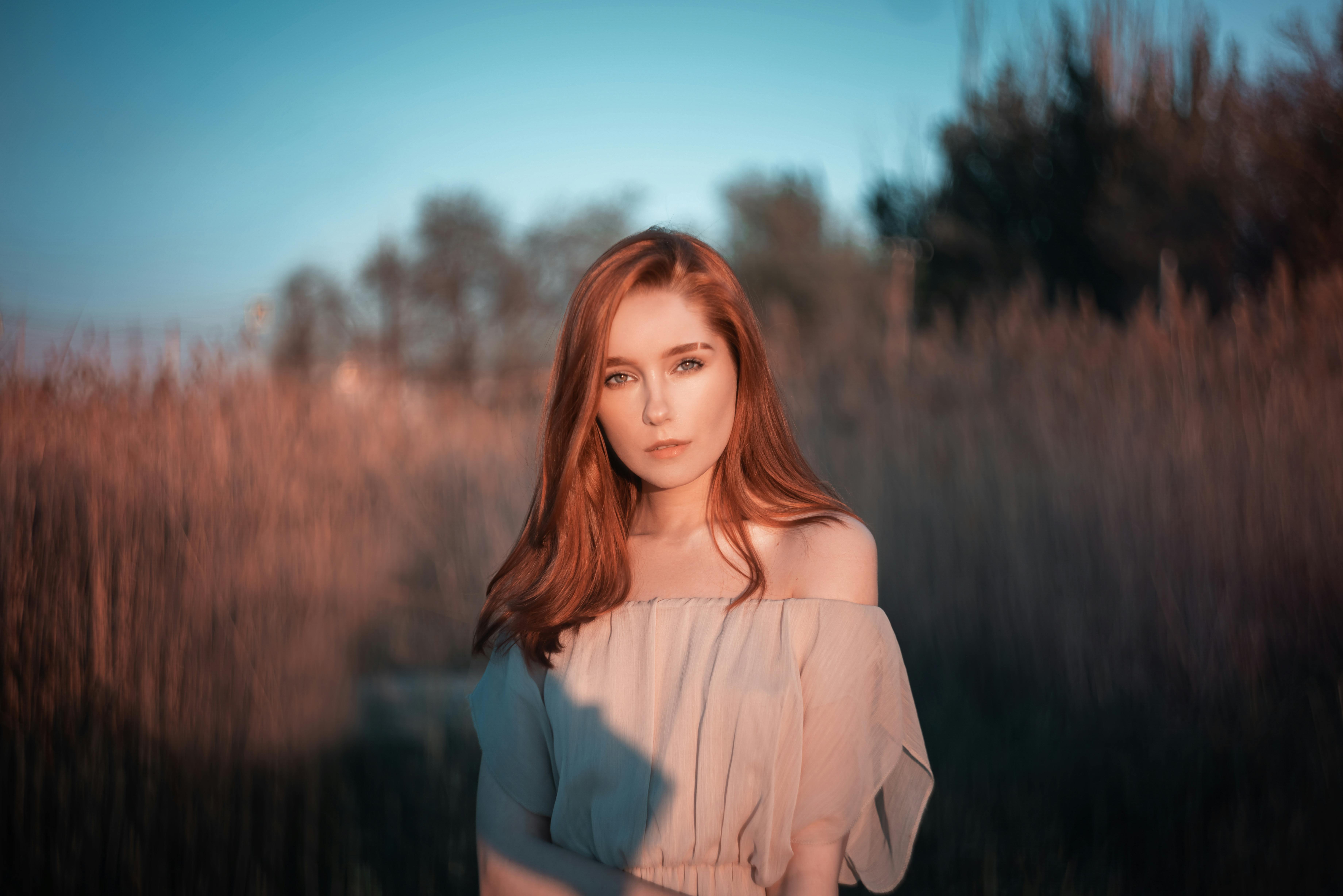 Woman Posing On A Concrete Post · Free Stock Photo