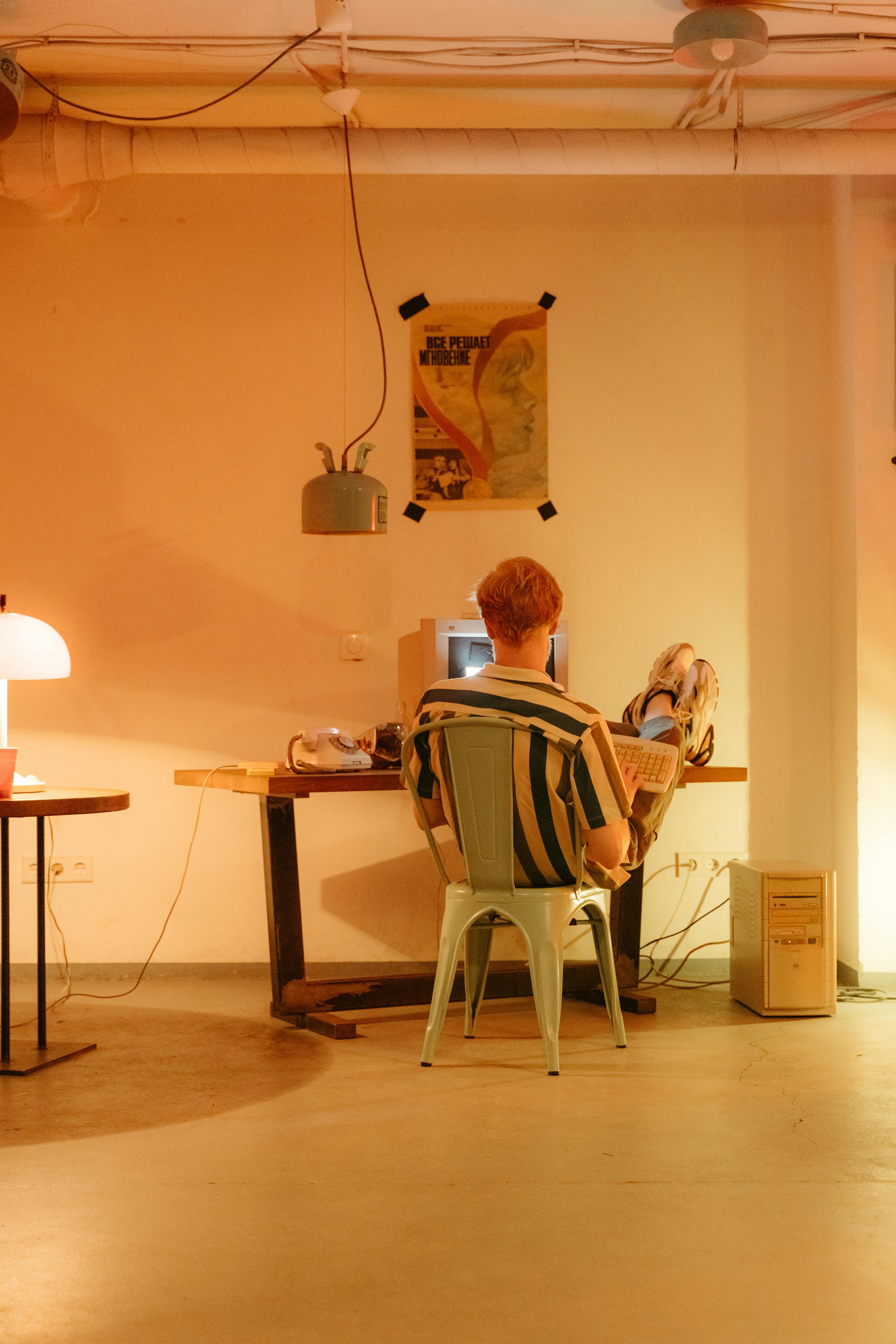 Man Sitting with Vintage Computer · Free Stock Photo