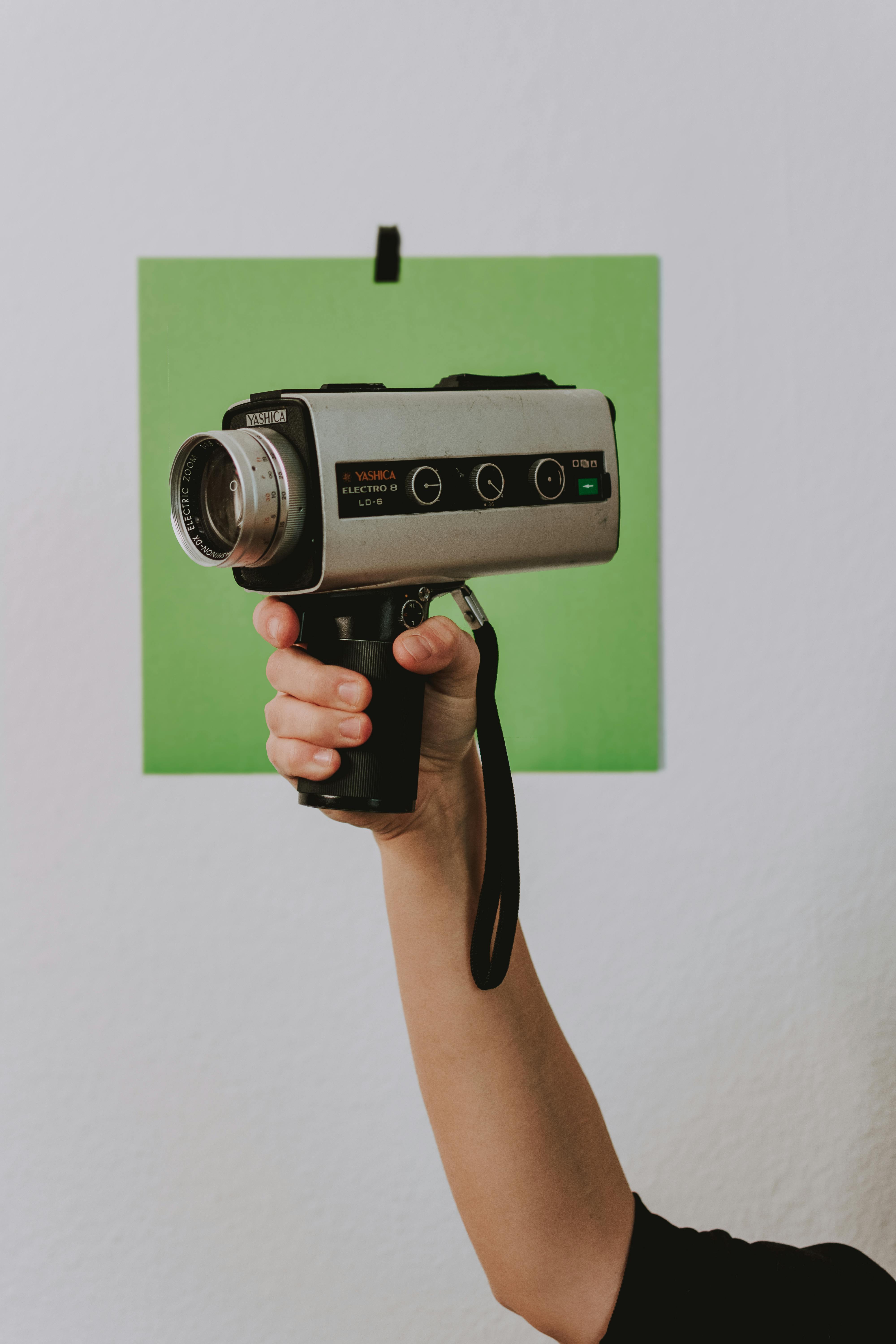 Woman Hands Holding Camera · Free Stock Photo