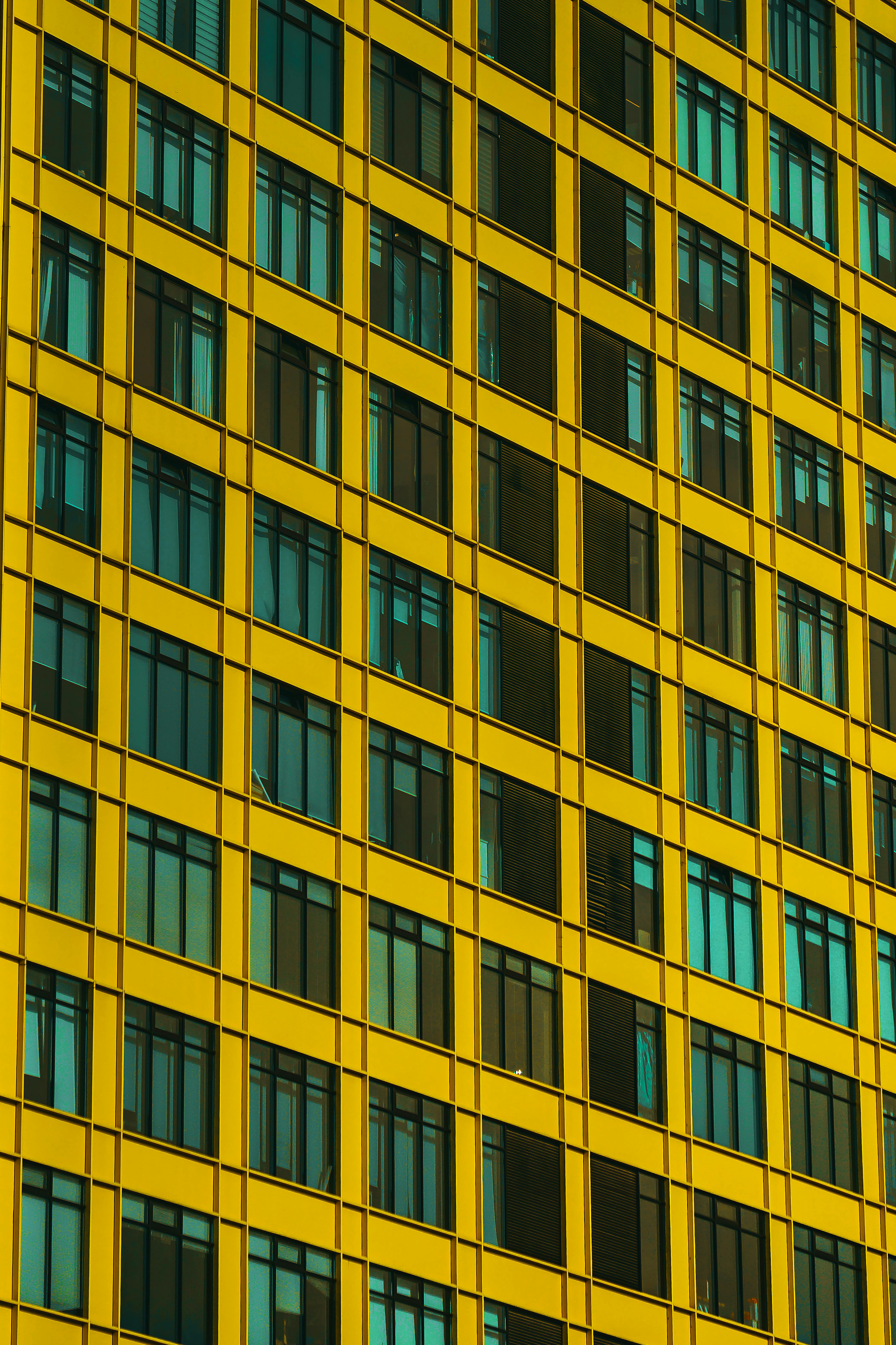 Yellow Building Full of Windows · Free Stock Photo