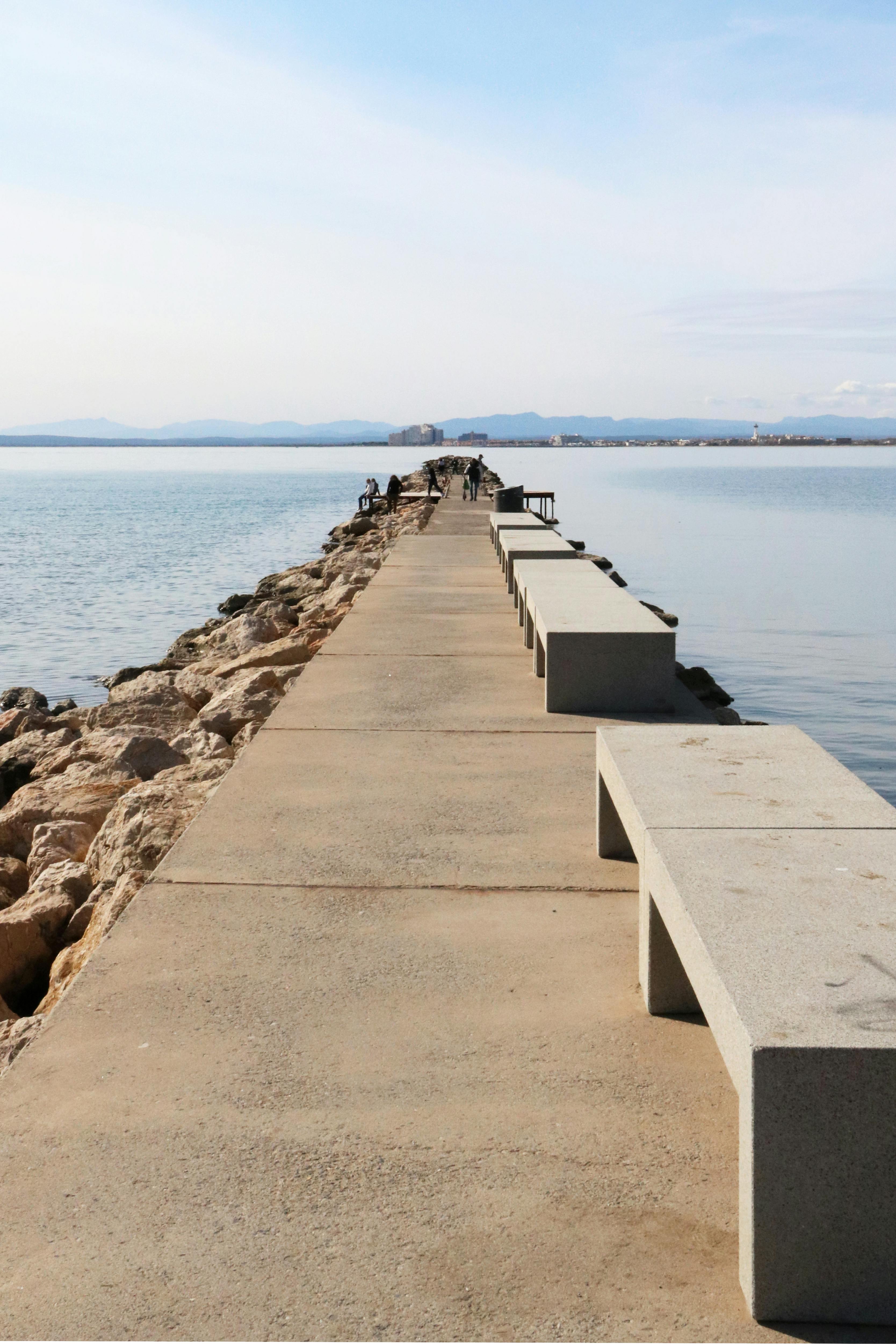 Concrete Benches over the Seawall · Free Stock Photo