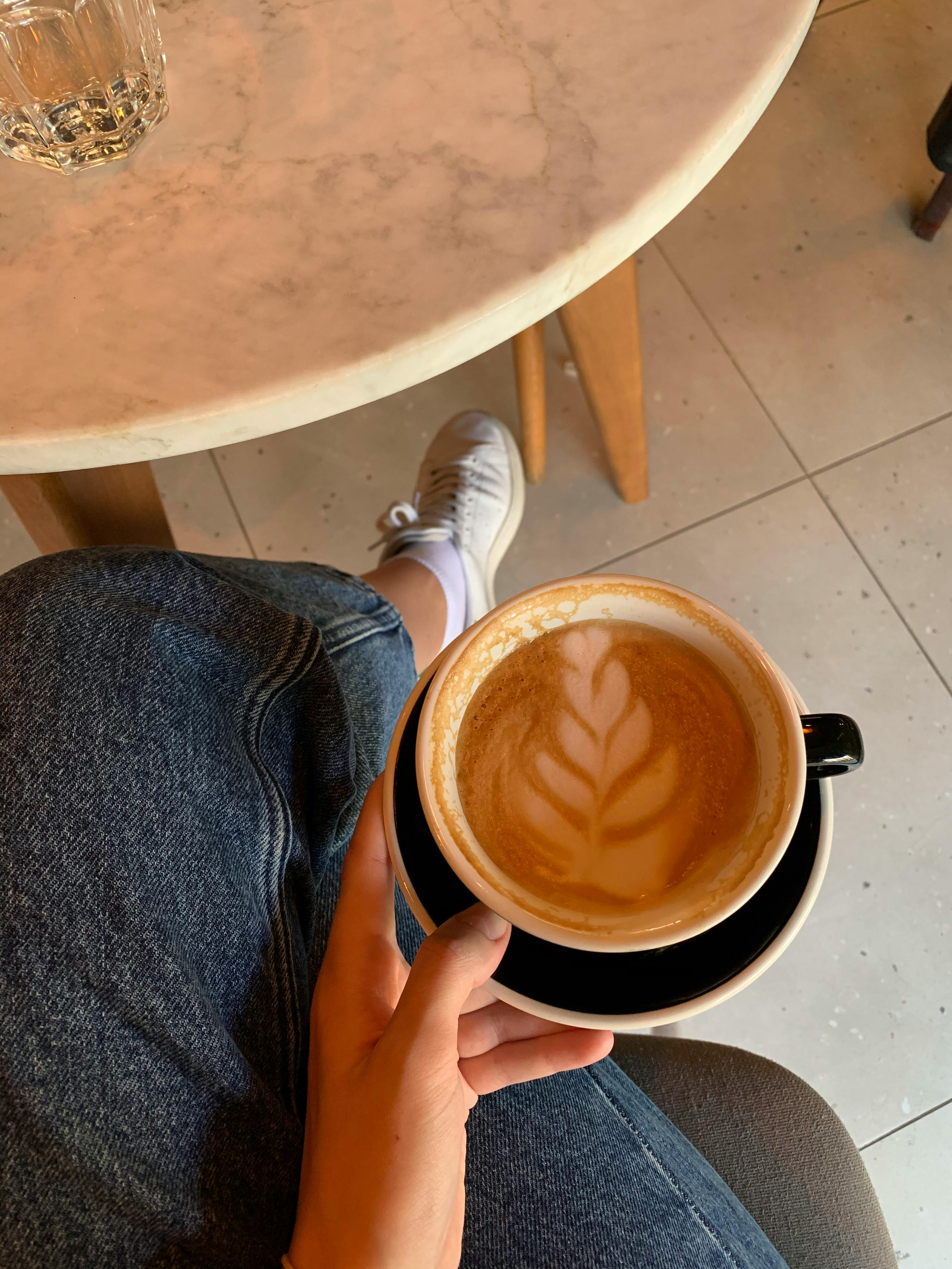 A Person Holding a Cup · Free Stock Photo