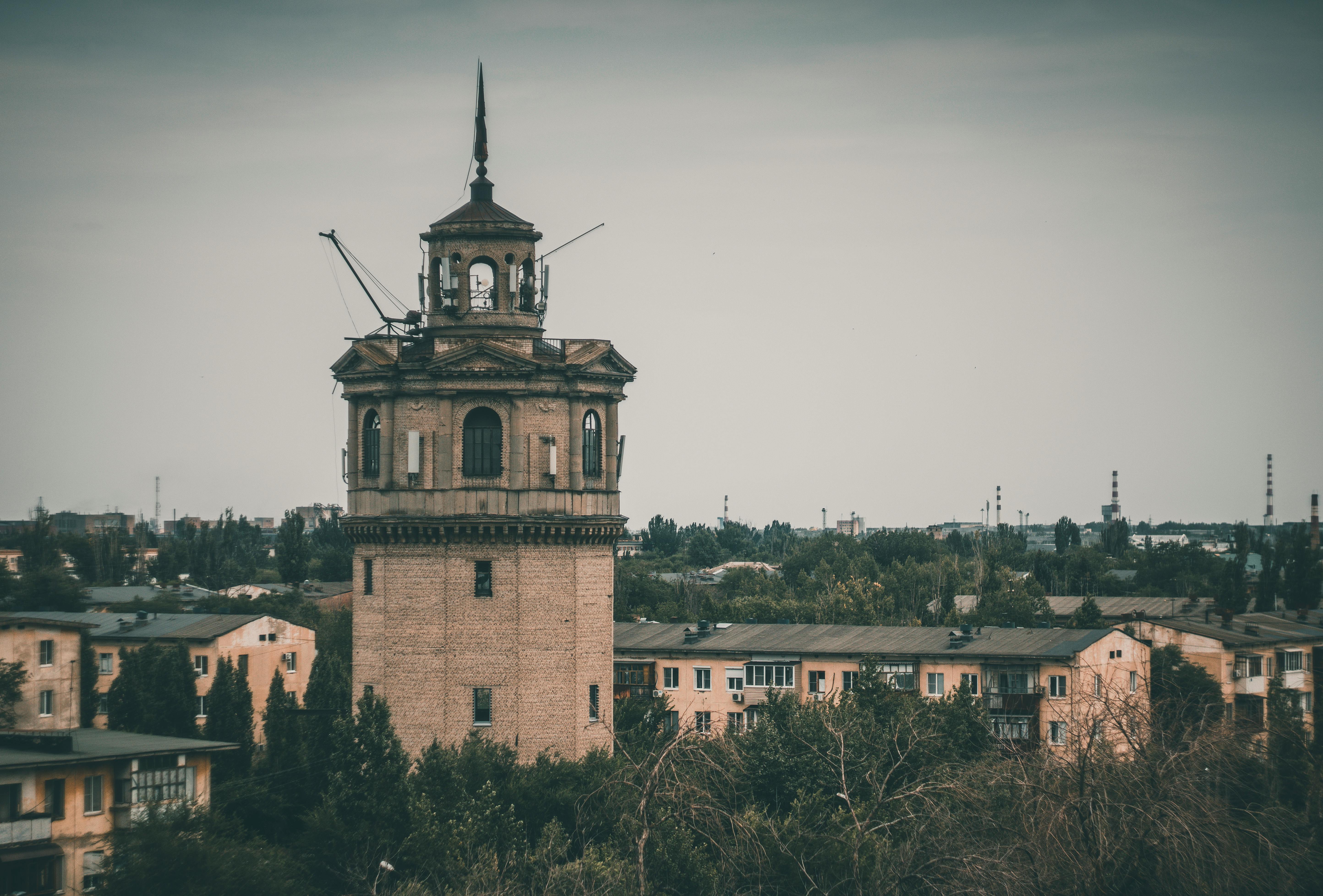 Old City Tower and Buildings Roofs · Free Stock Photo