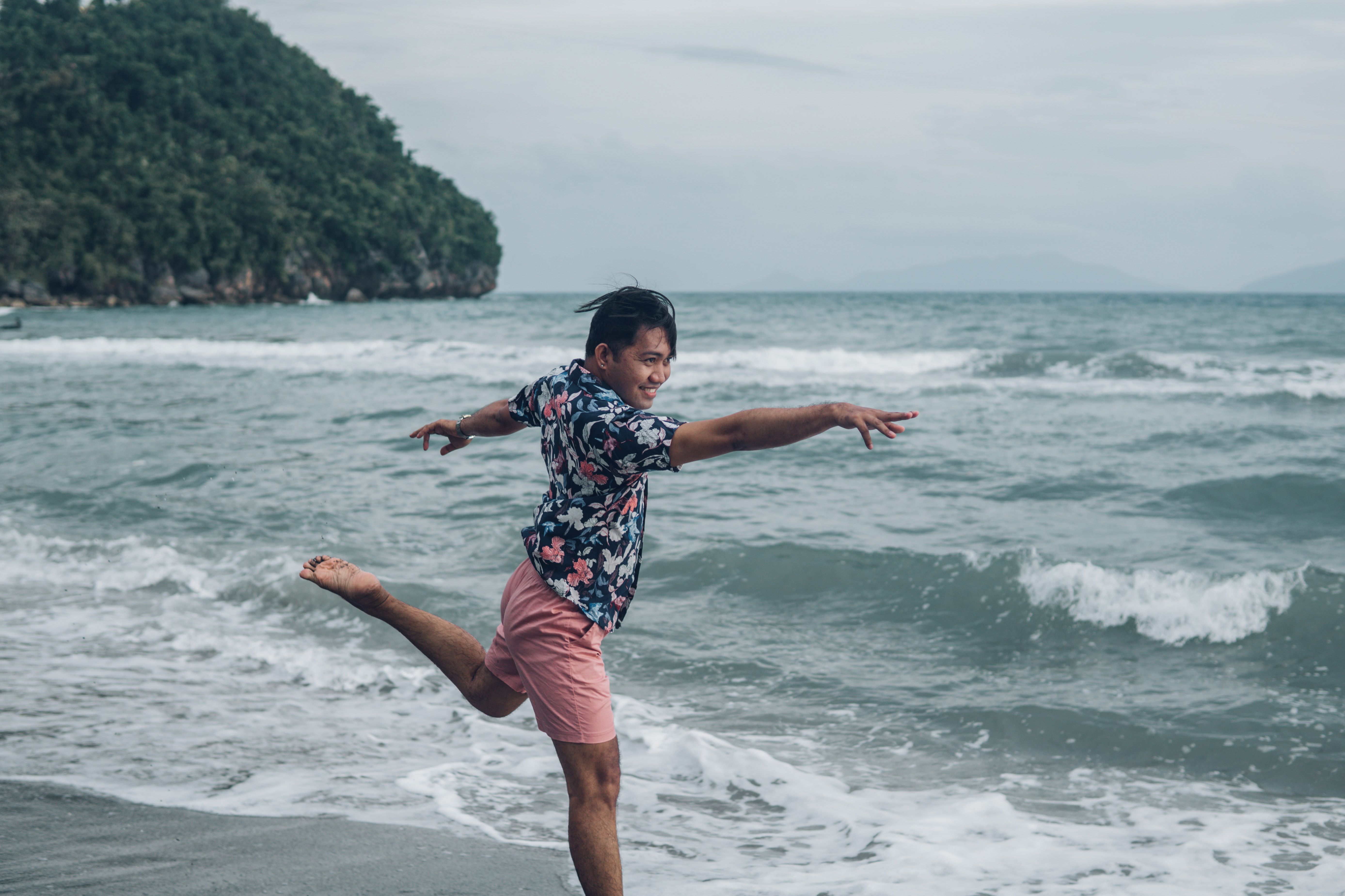 A Man Posing at the Beach · Free Stock Photo