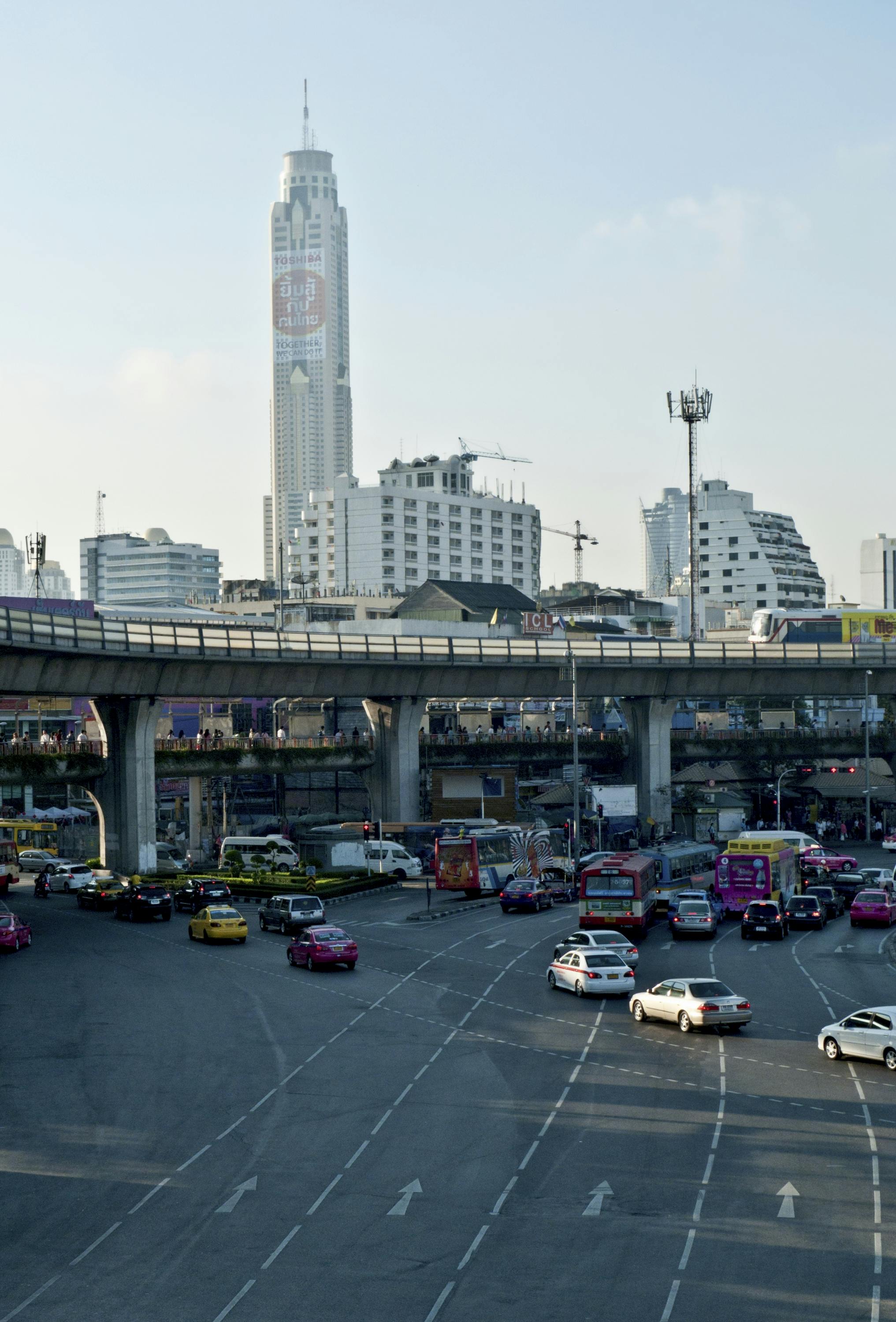 Crowded Street With Cars Passing By · Free Stock Photo