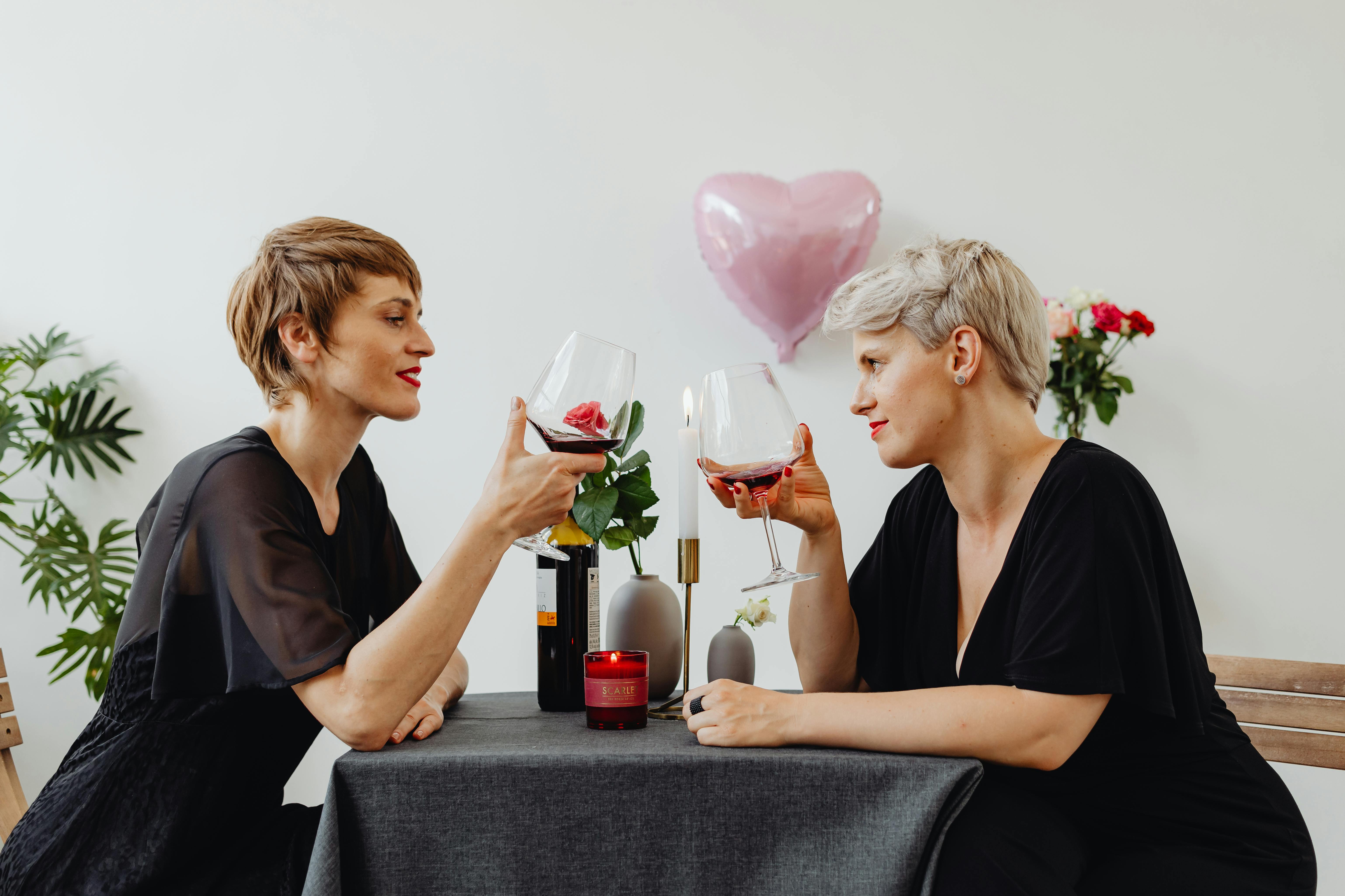 A Couple Sitting at the Table · Free Stock Photo