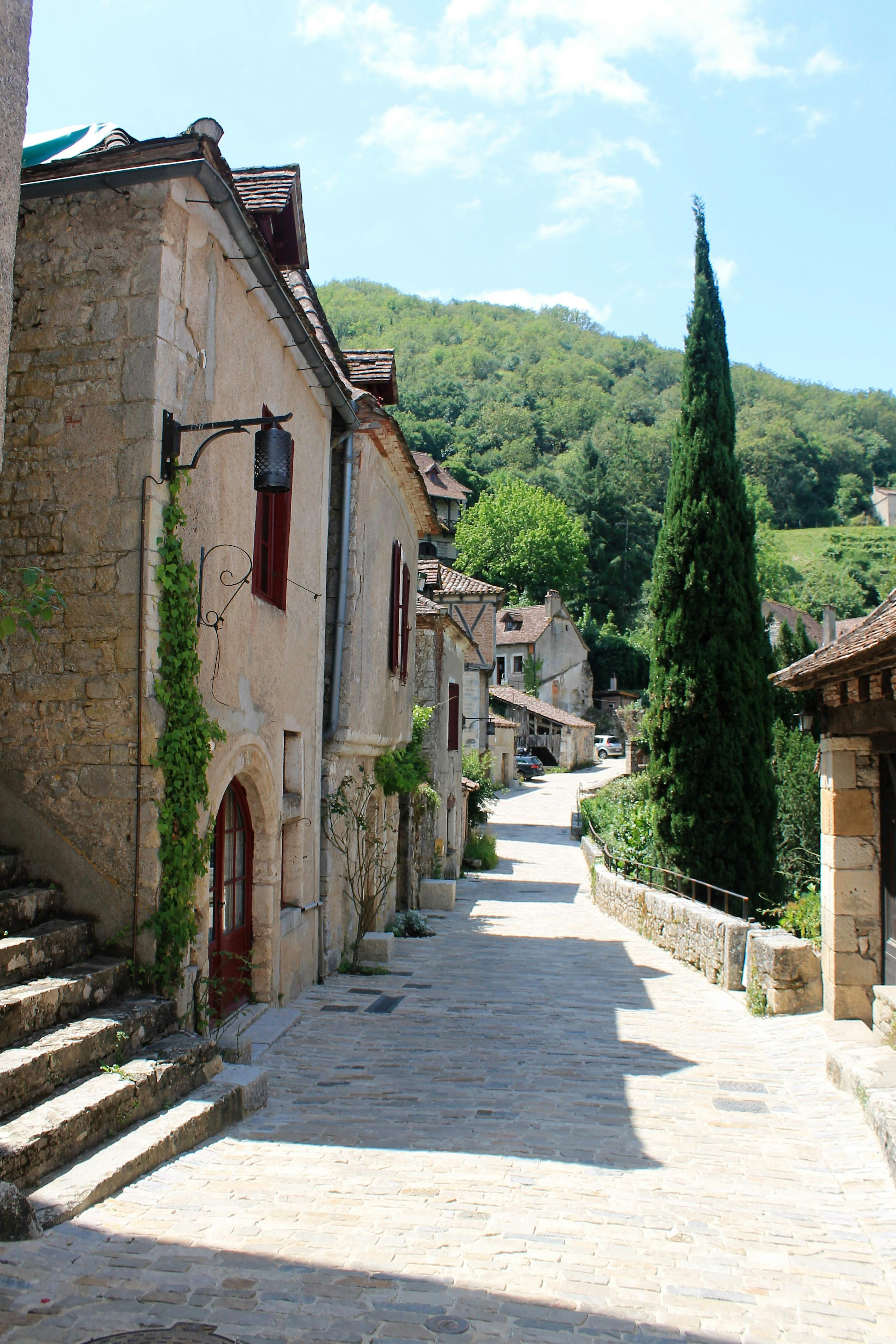 Empty Road Between Houses · Free Stock Photo
