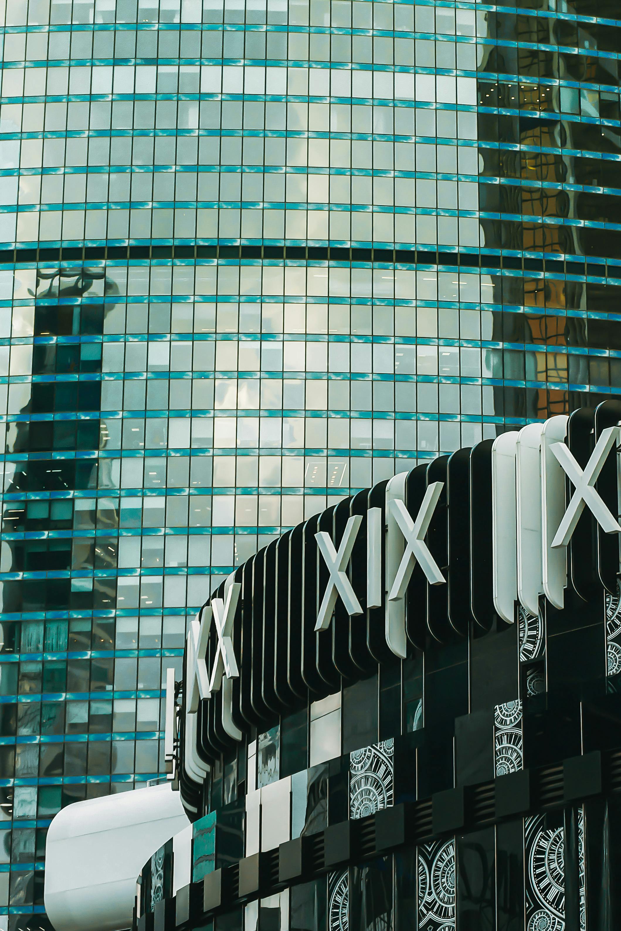 Glass Panel Windows of a Building · Free Stock Photo